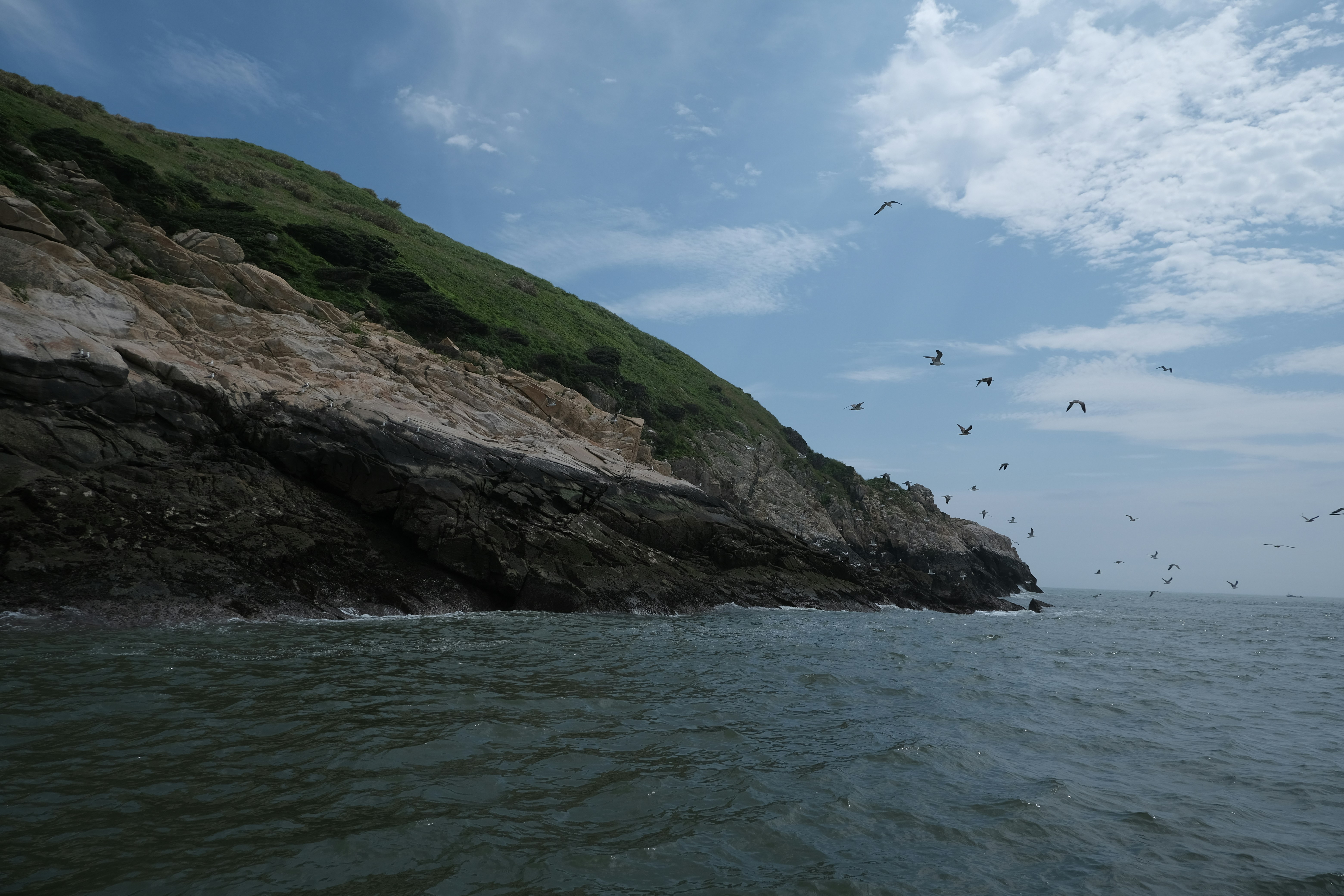 Cliffside Coastline Under a Wide Sky