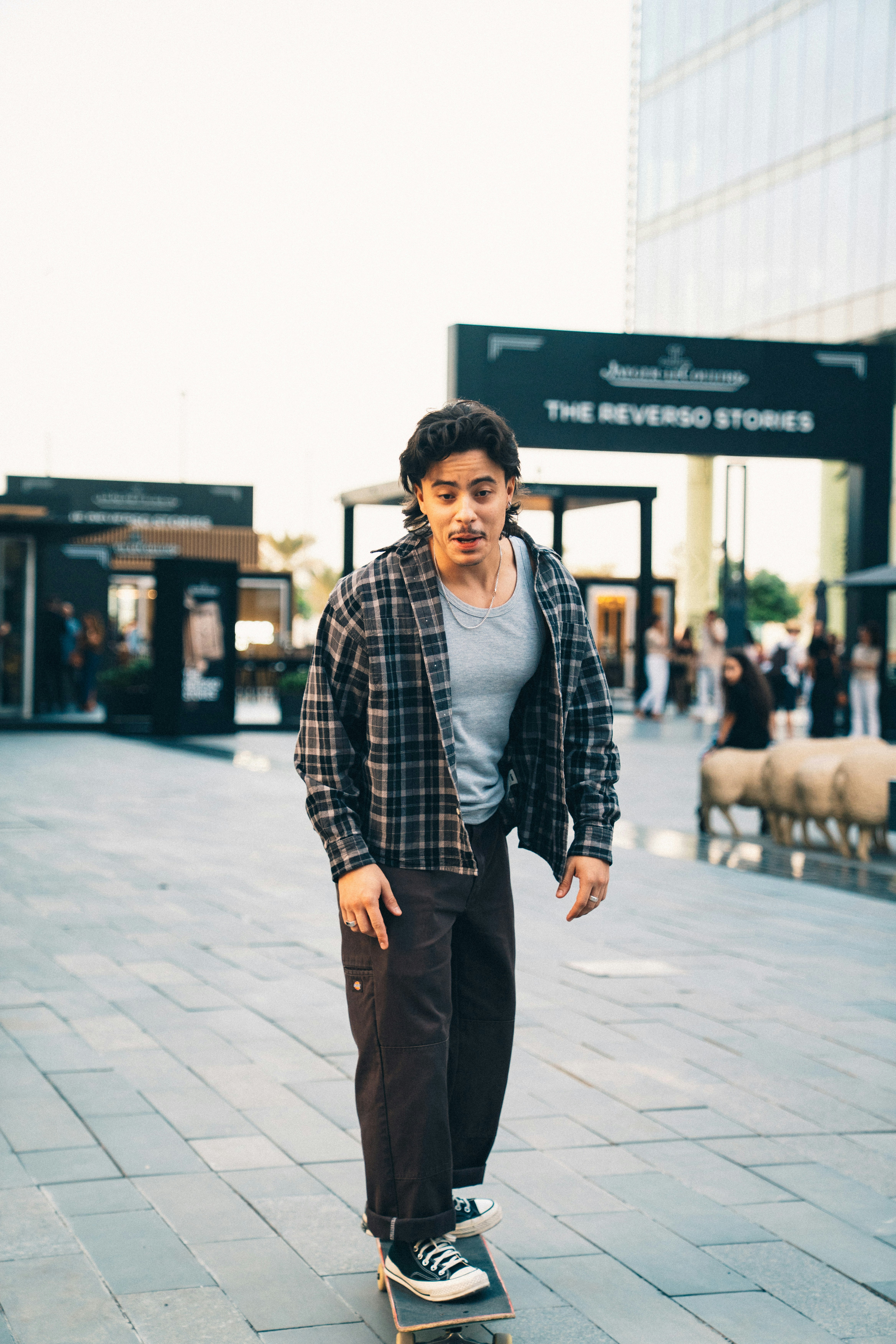 Skater in City Light: A Moment of Balance