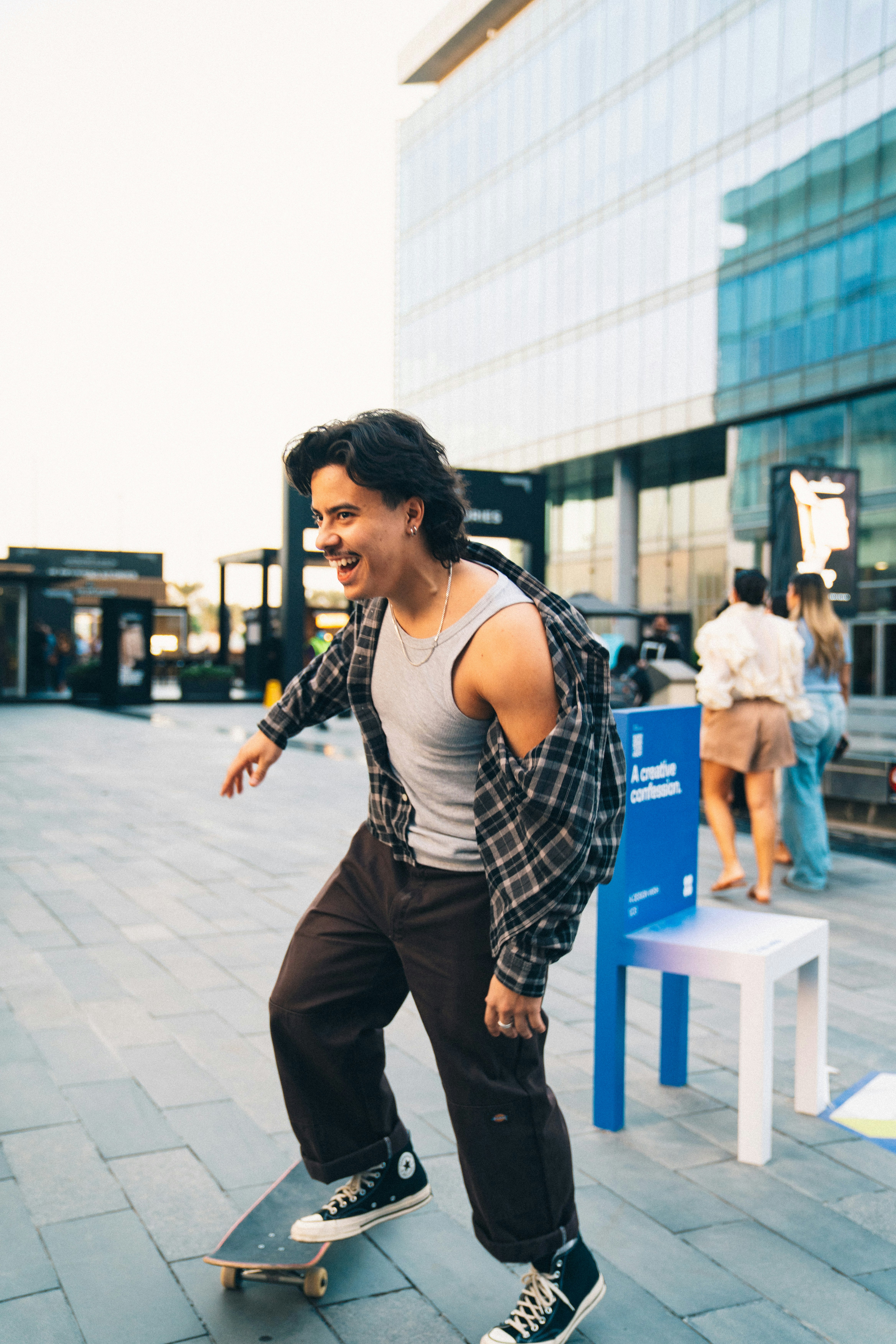 Skateboarder in Motion: Urban Glass and Sunshine