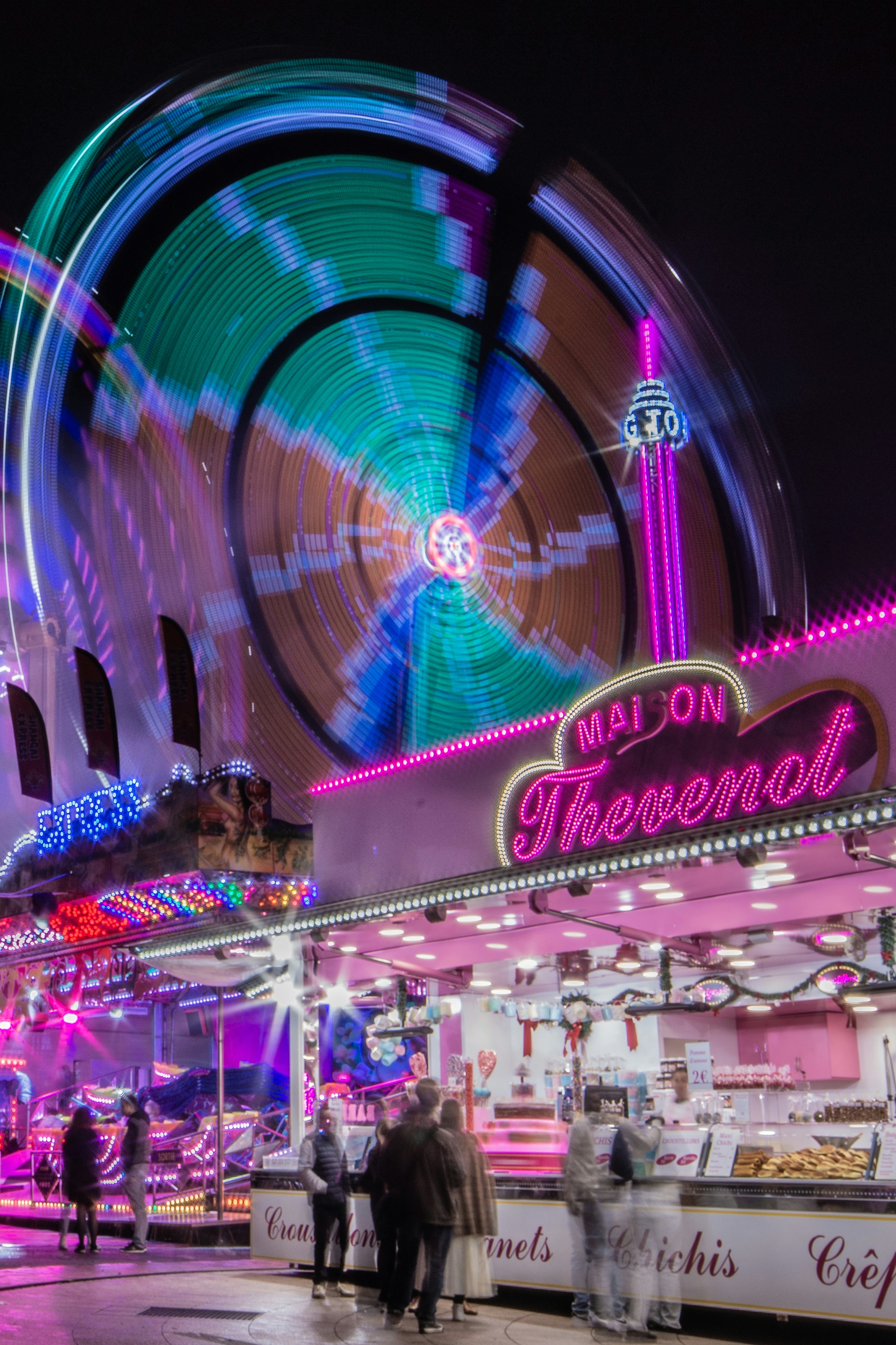 Neon Carousel: Nighttime Thrills at the Therenal Fair