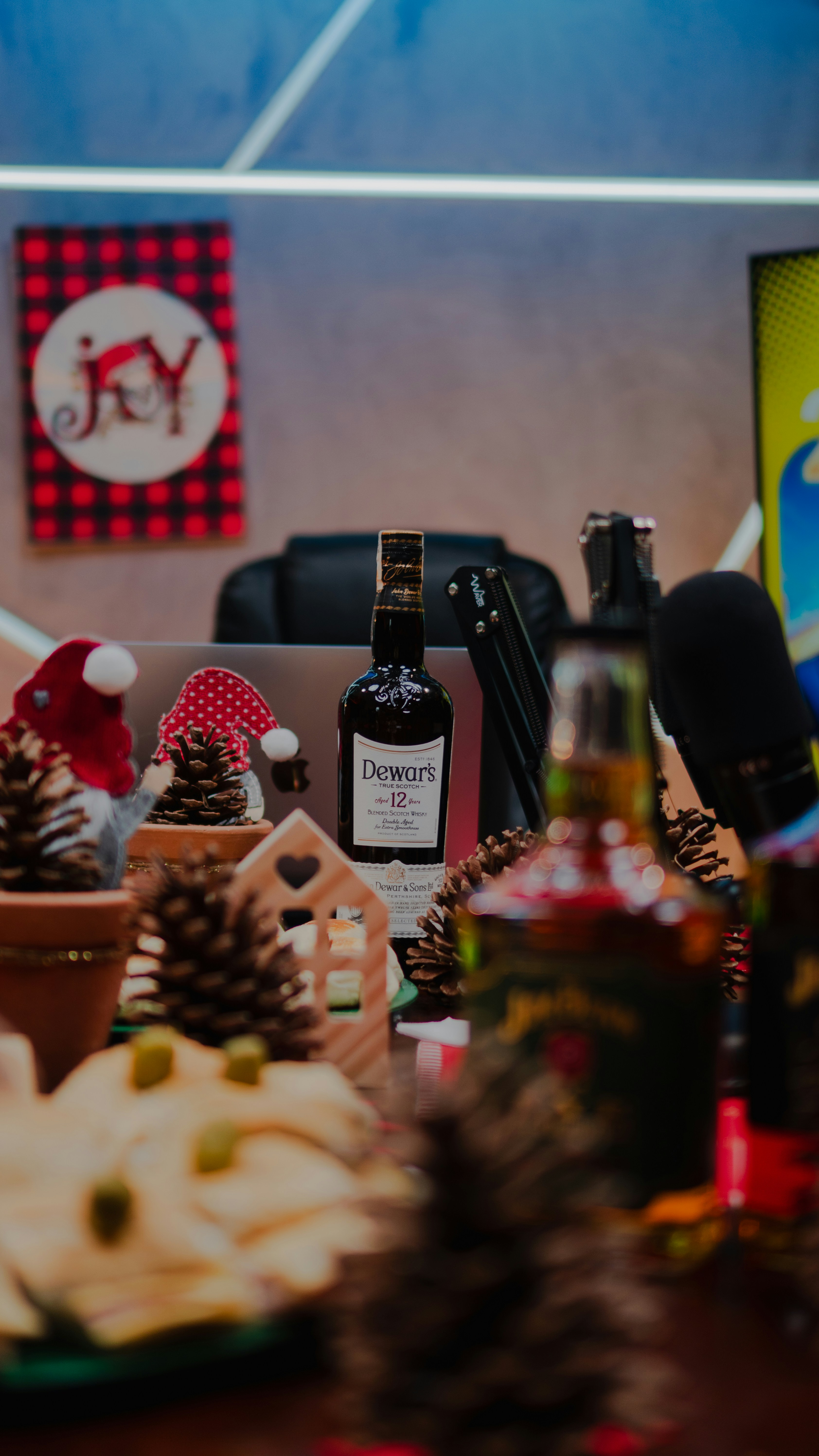 Center Stage on the Holiday Table: Dewars Bottle Amid Festive Props