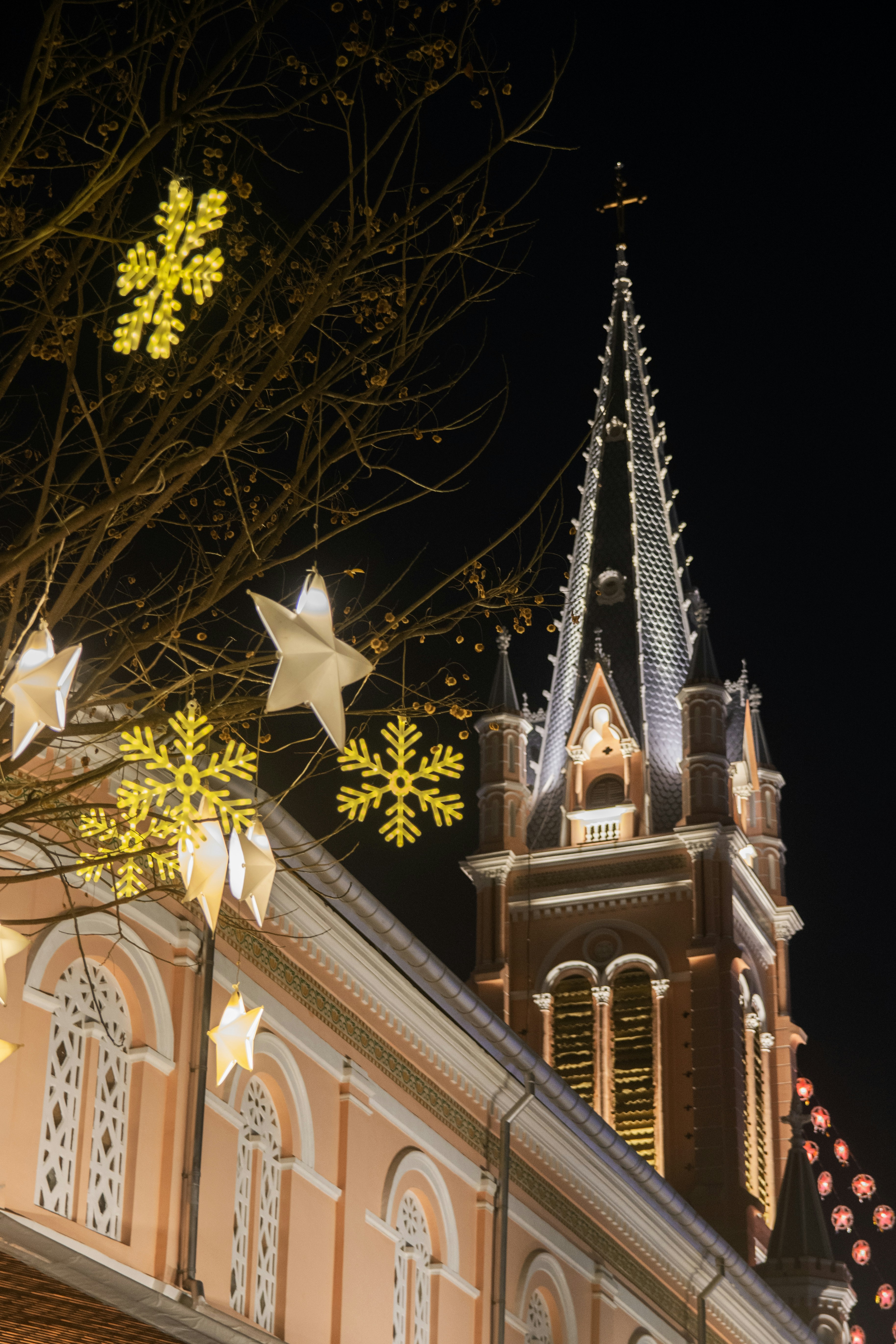 Spire of Night: Illuminated Clocktower against a Frosted Sky