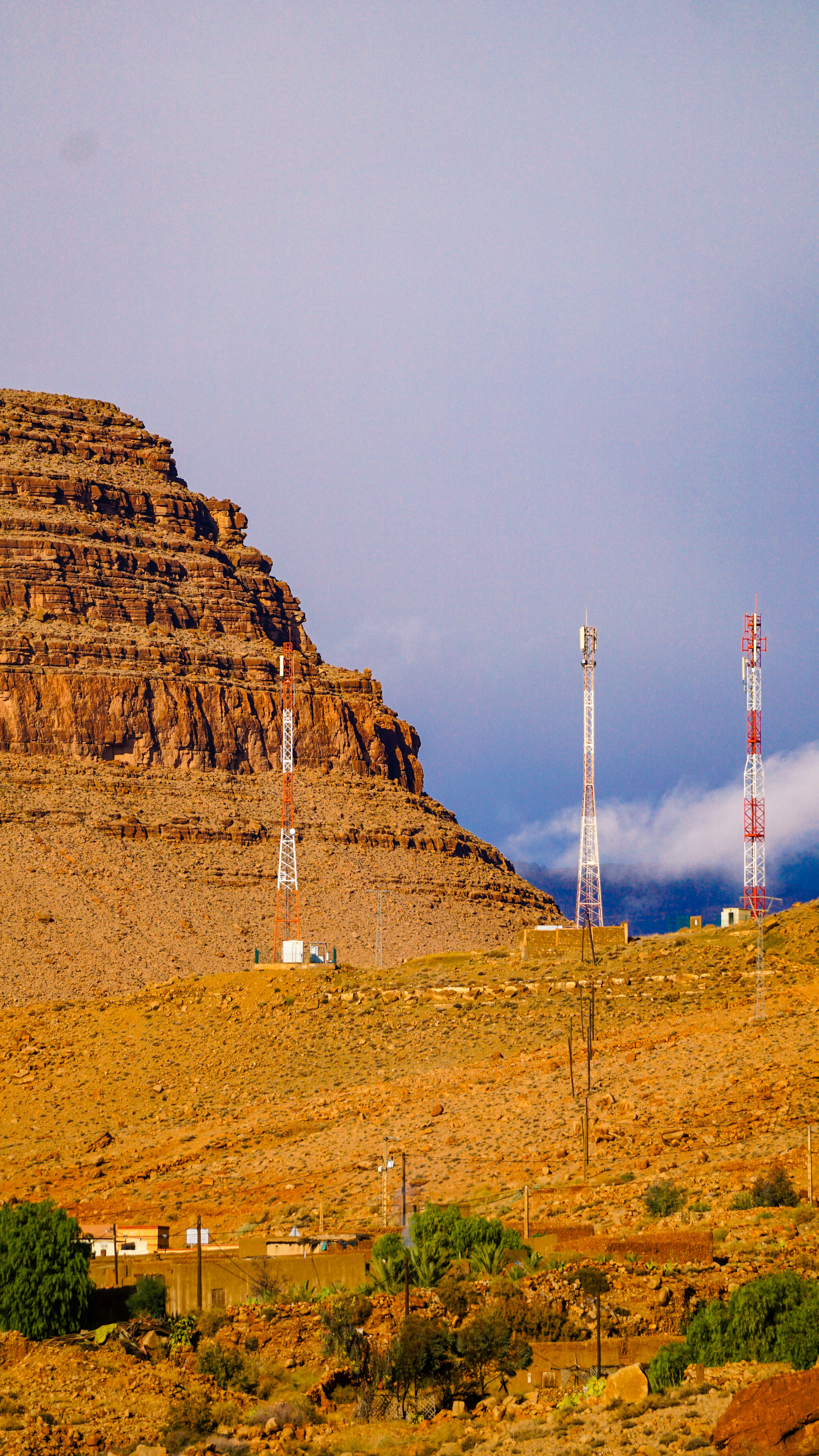 Desert Plateau with Communication Towers under a Quiet Horizon