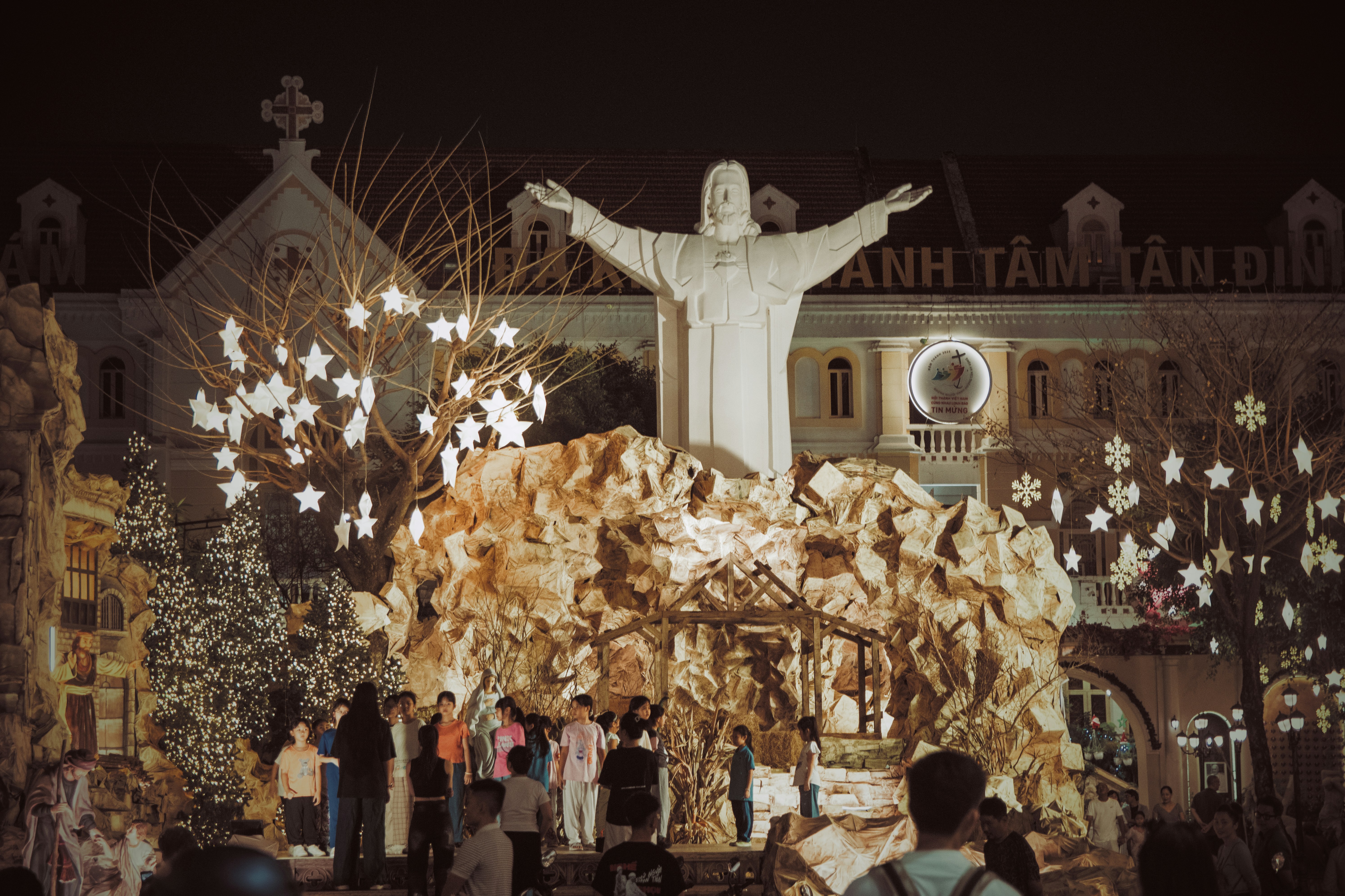 Night at the Rocking Nativity: A Monumental Scene with Starry Lights