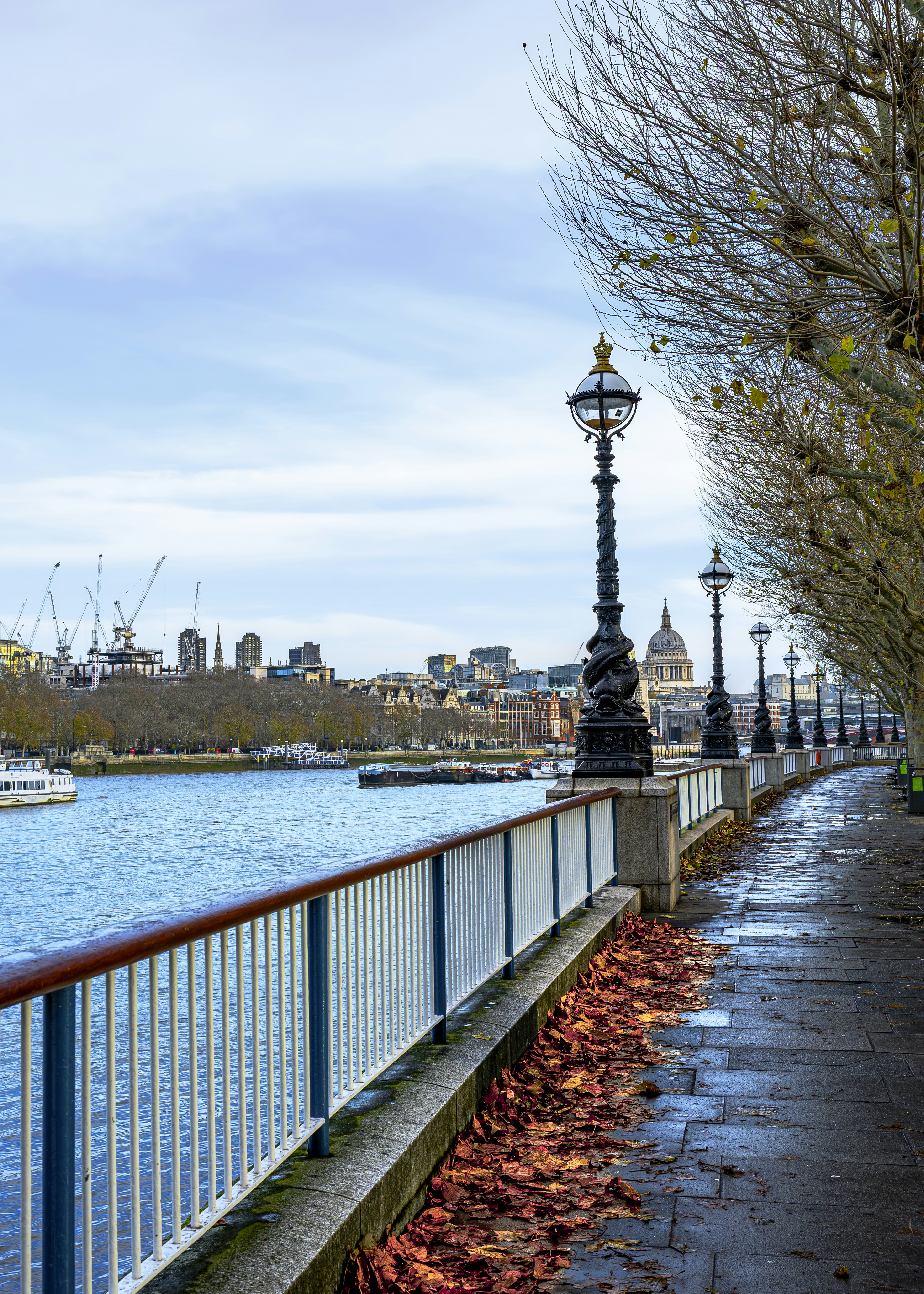 Riverside Lanterns Along a Winter Thames Walk