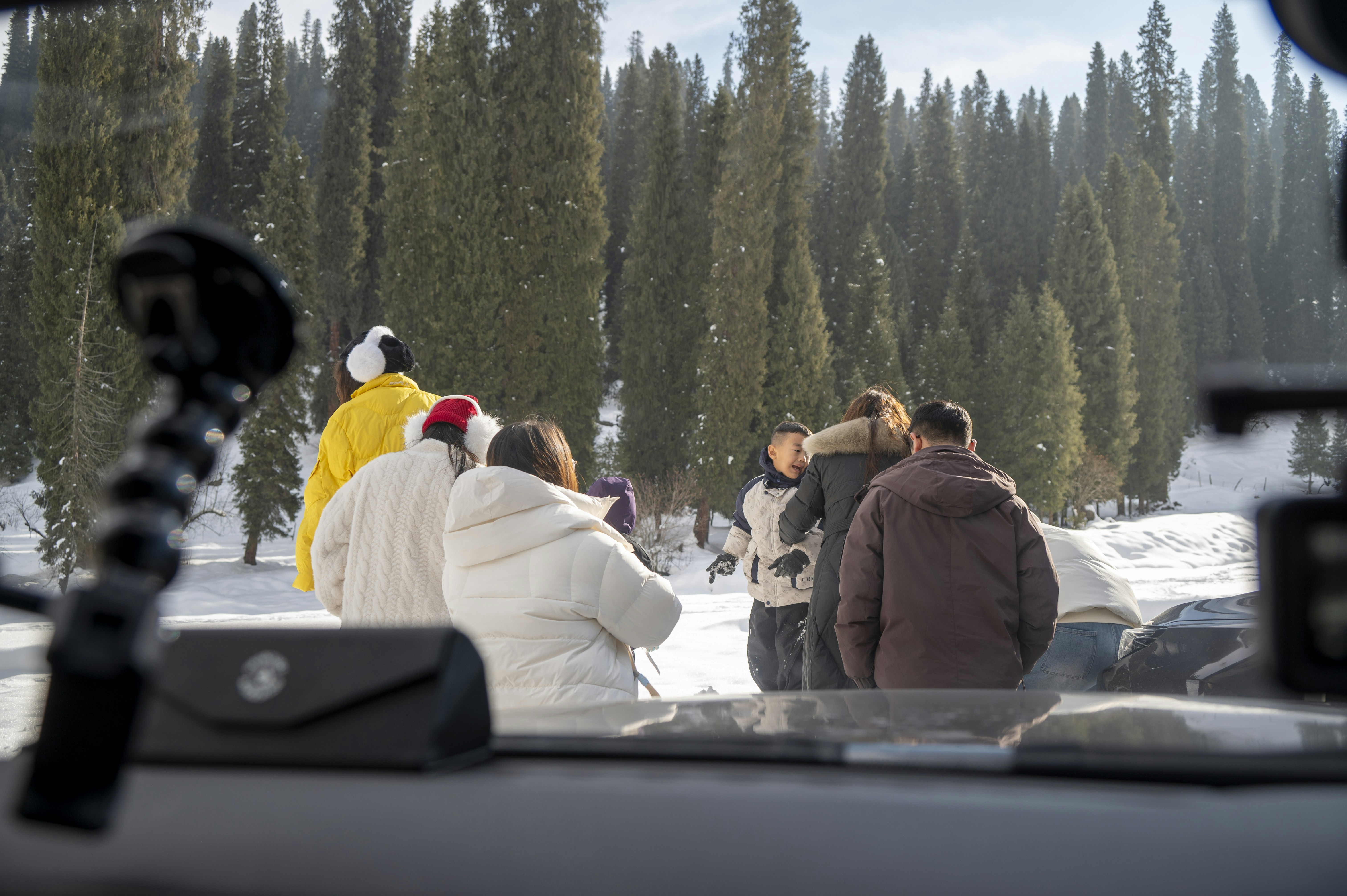 Crew behind the Scenes: Snowy Stage Hands and Focused Moments