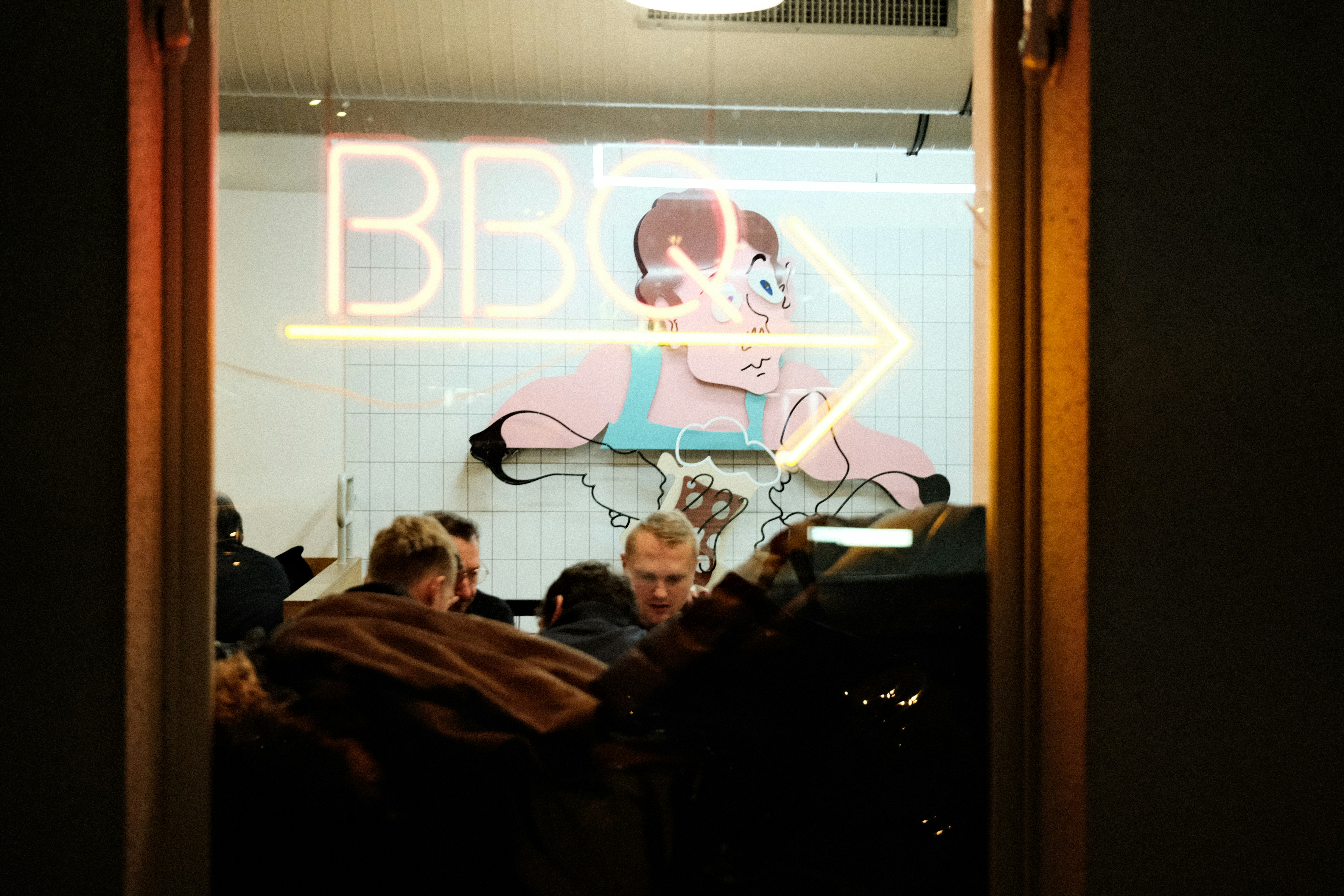 Neon Sign, Portraits, and a Sketch of a Smile