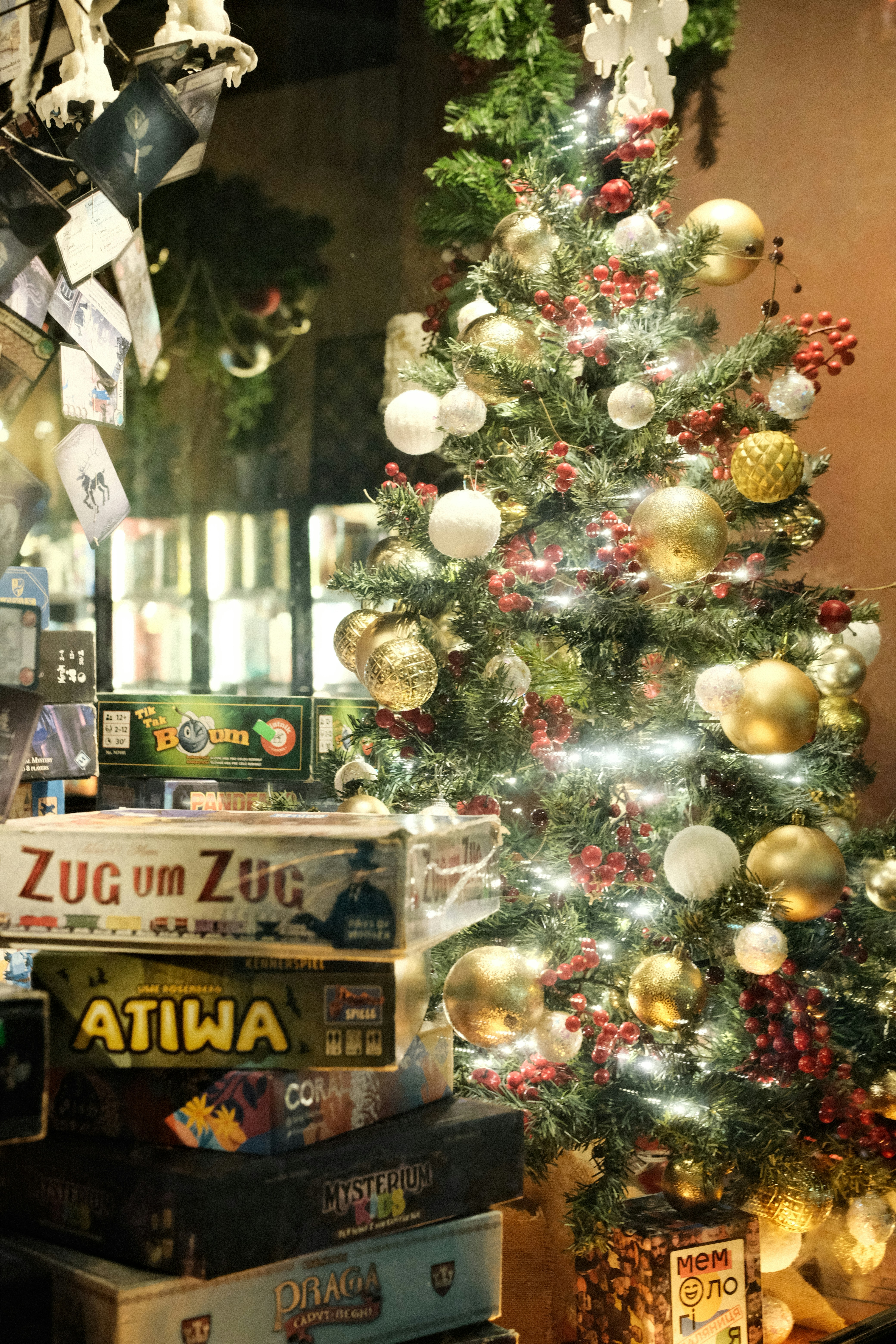 Christmas tree with decorations and board games