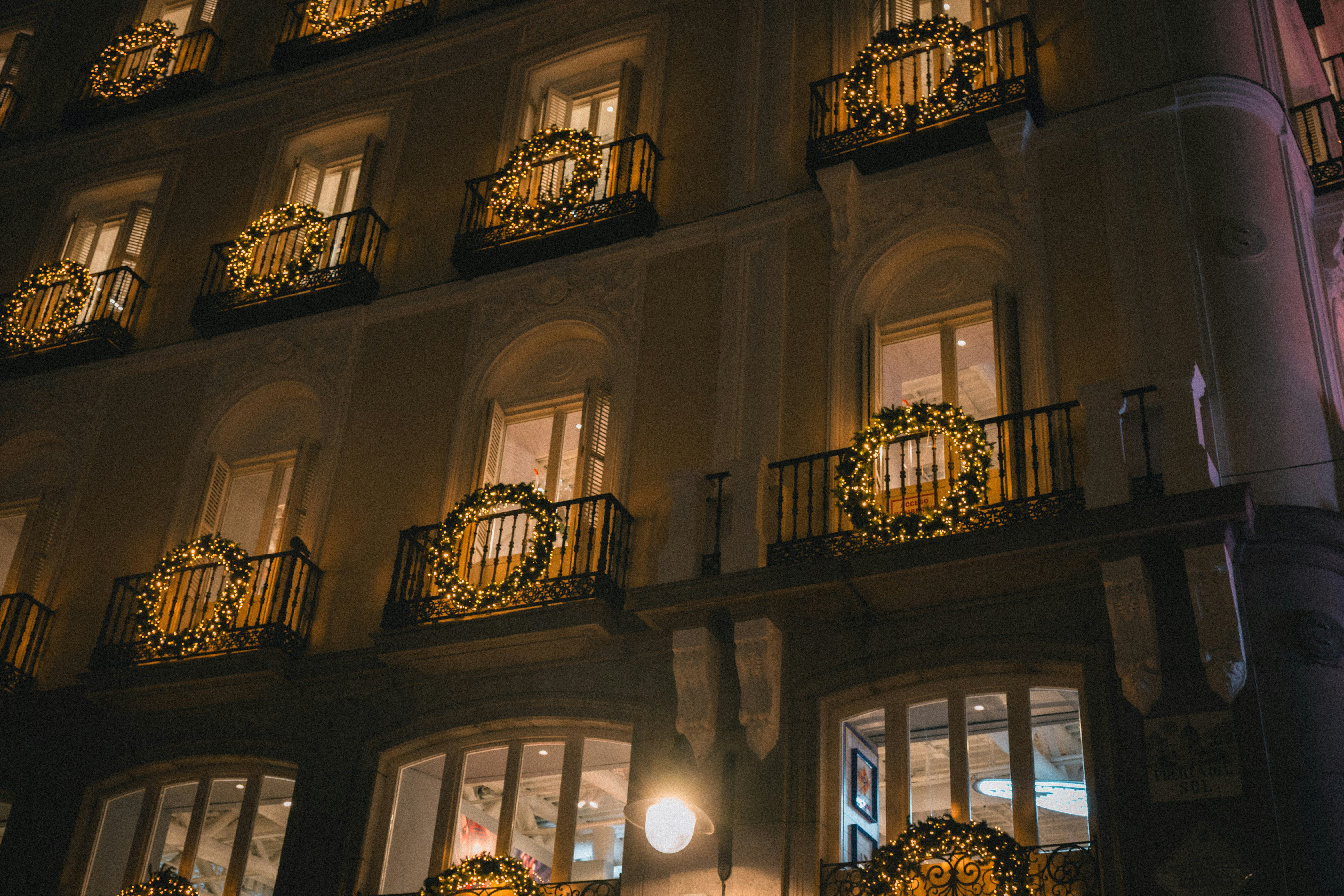 Warmly Lit Facades: Neon Ornaments in a French Street Centre