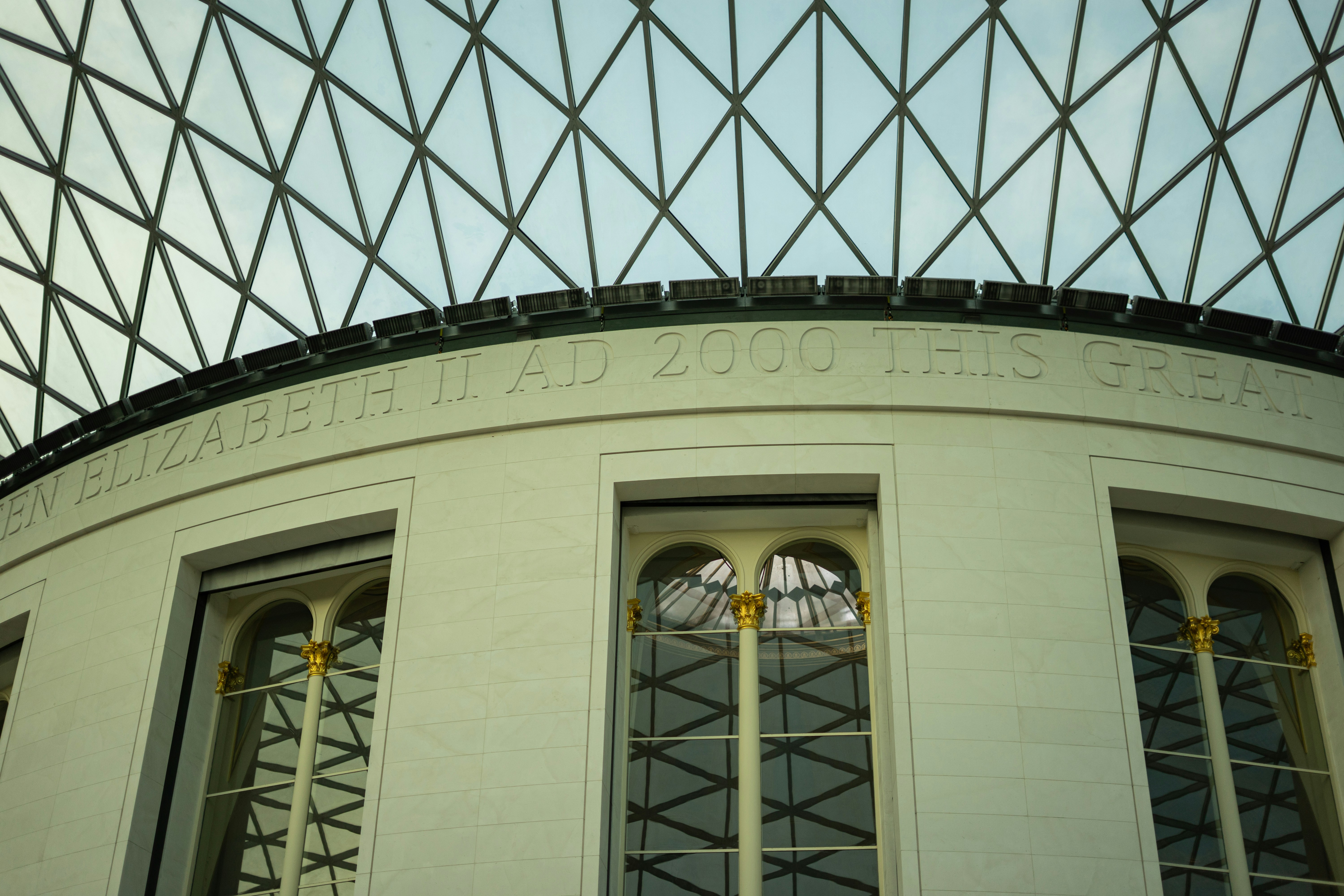 Vaulted Glass and Stone: A Facade Framed by Geometry