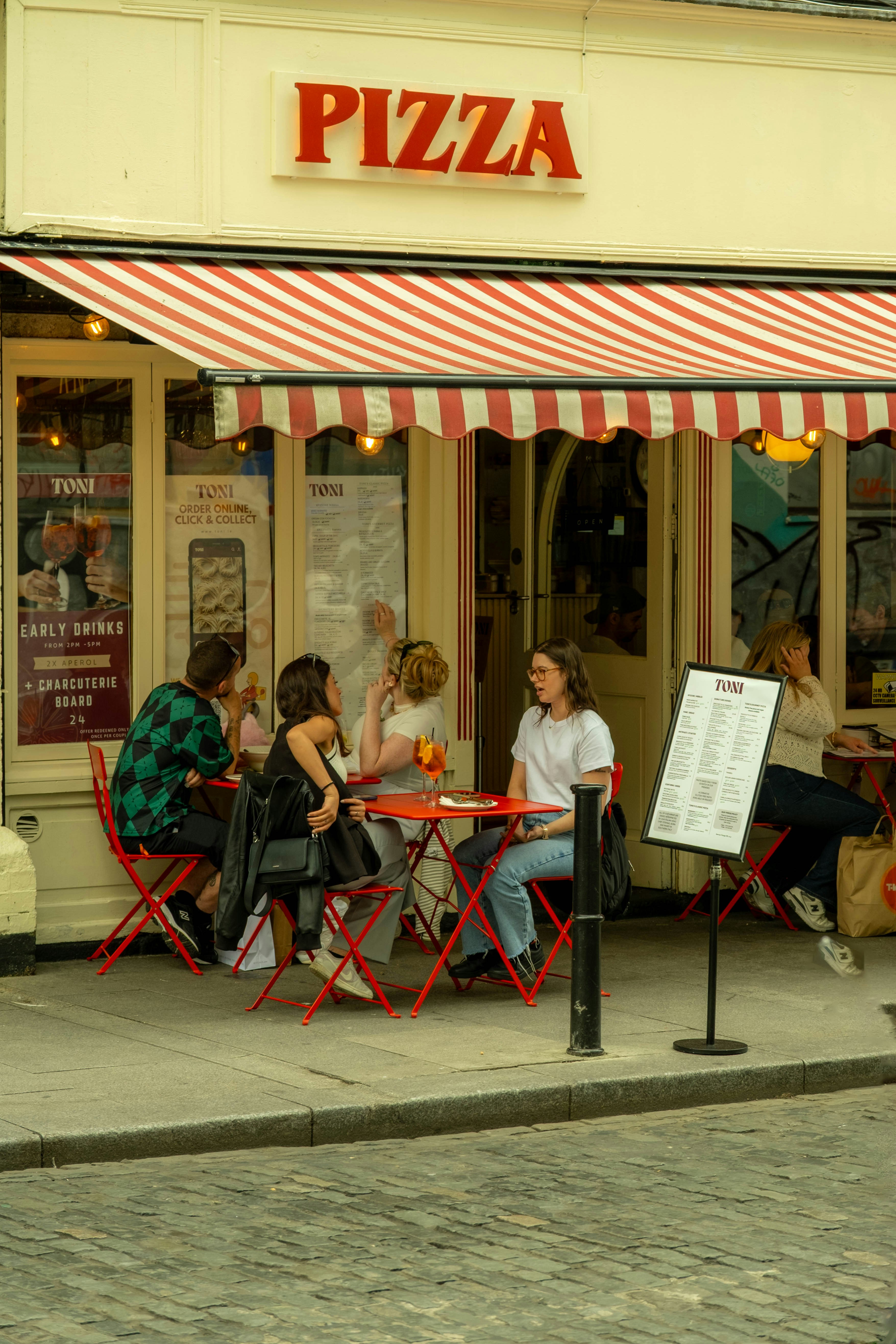 Bar-side Pizza Rendezvous on a Striped Day