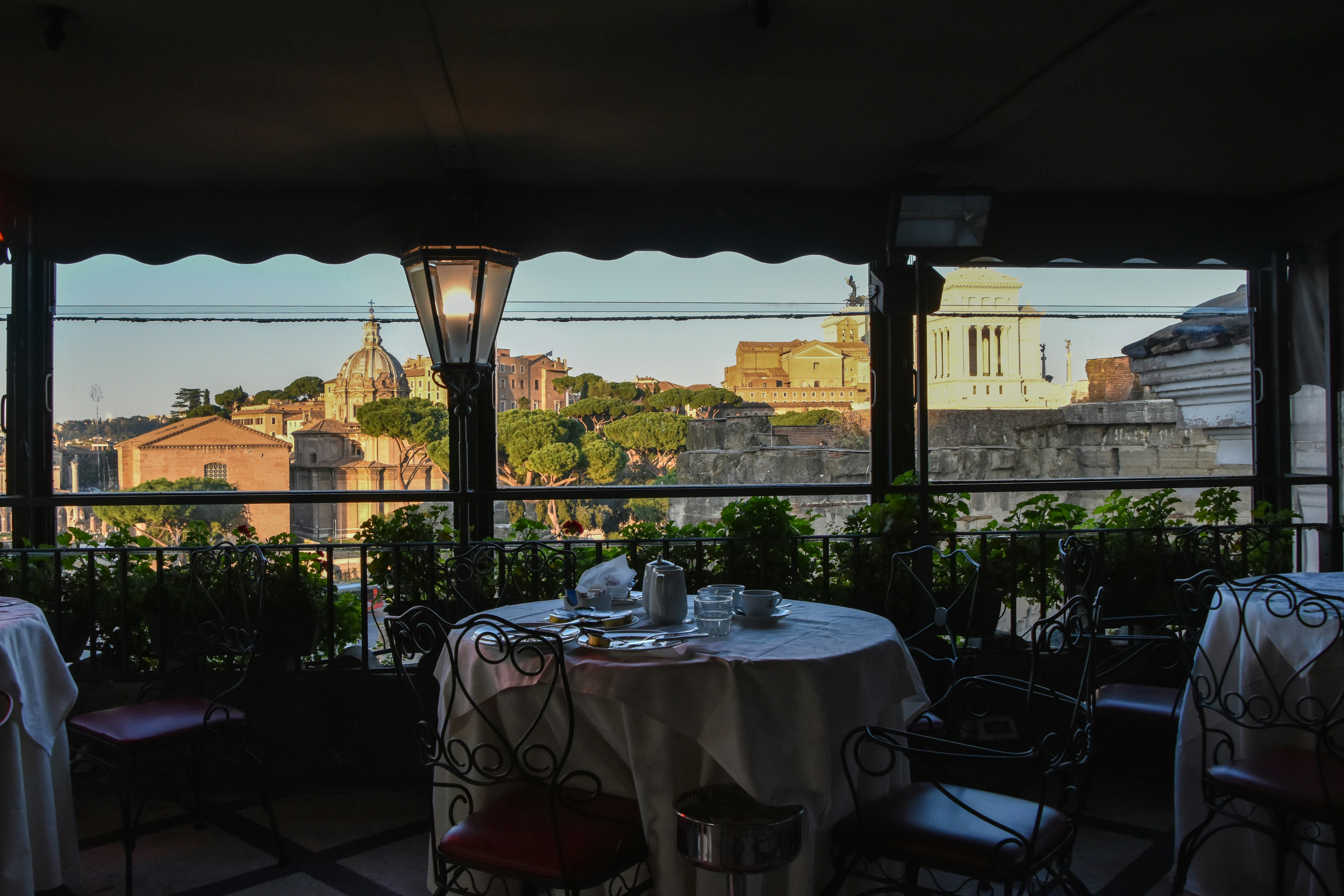 Rooftop restaurant view of historic roman buildings photo – Free ...
