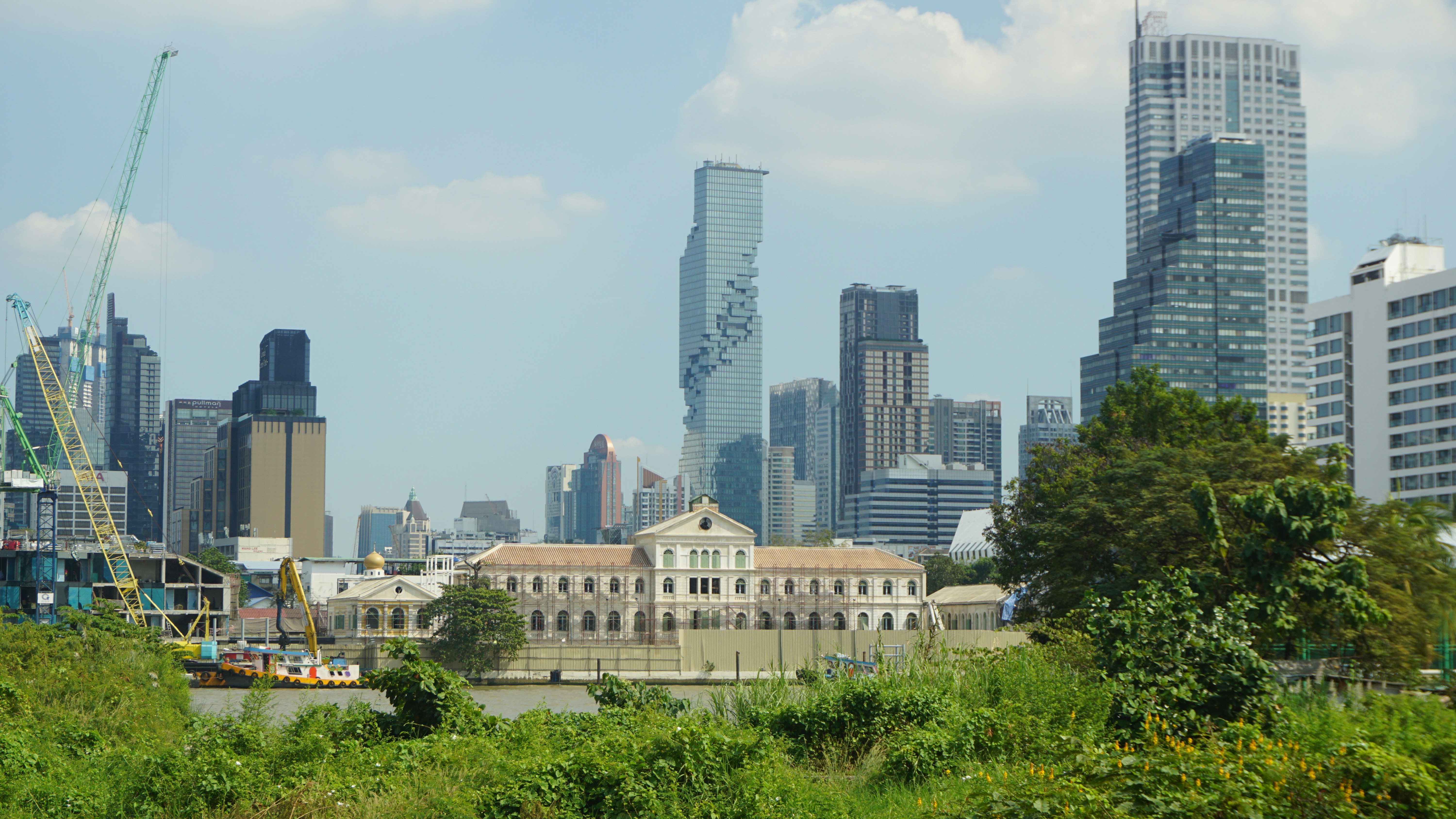 Cityscape in Bloom: Riverside Towers Rise Over Greenbank