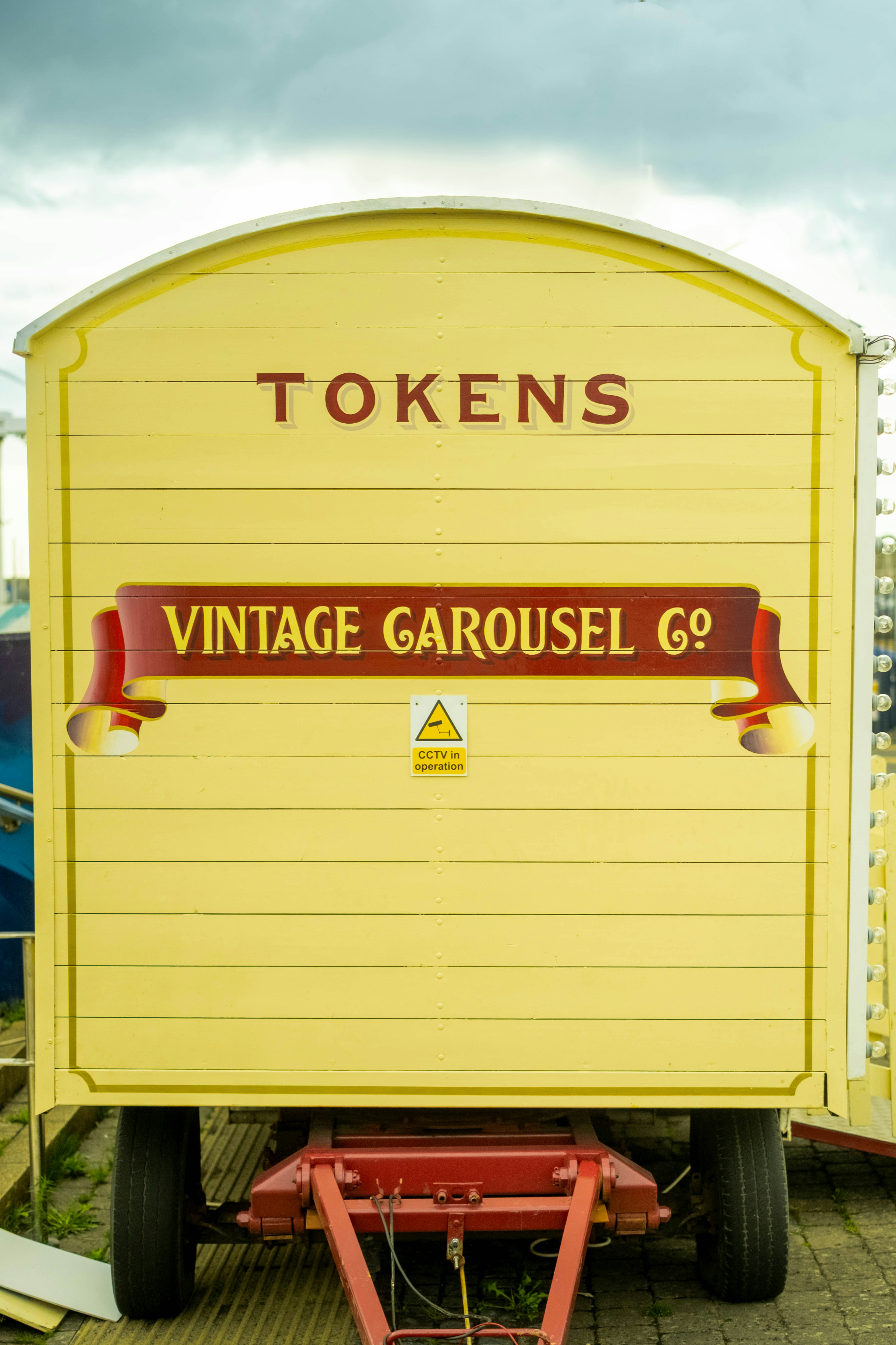 Tokens: A Sunny Front View of a Vintage Carousel Box