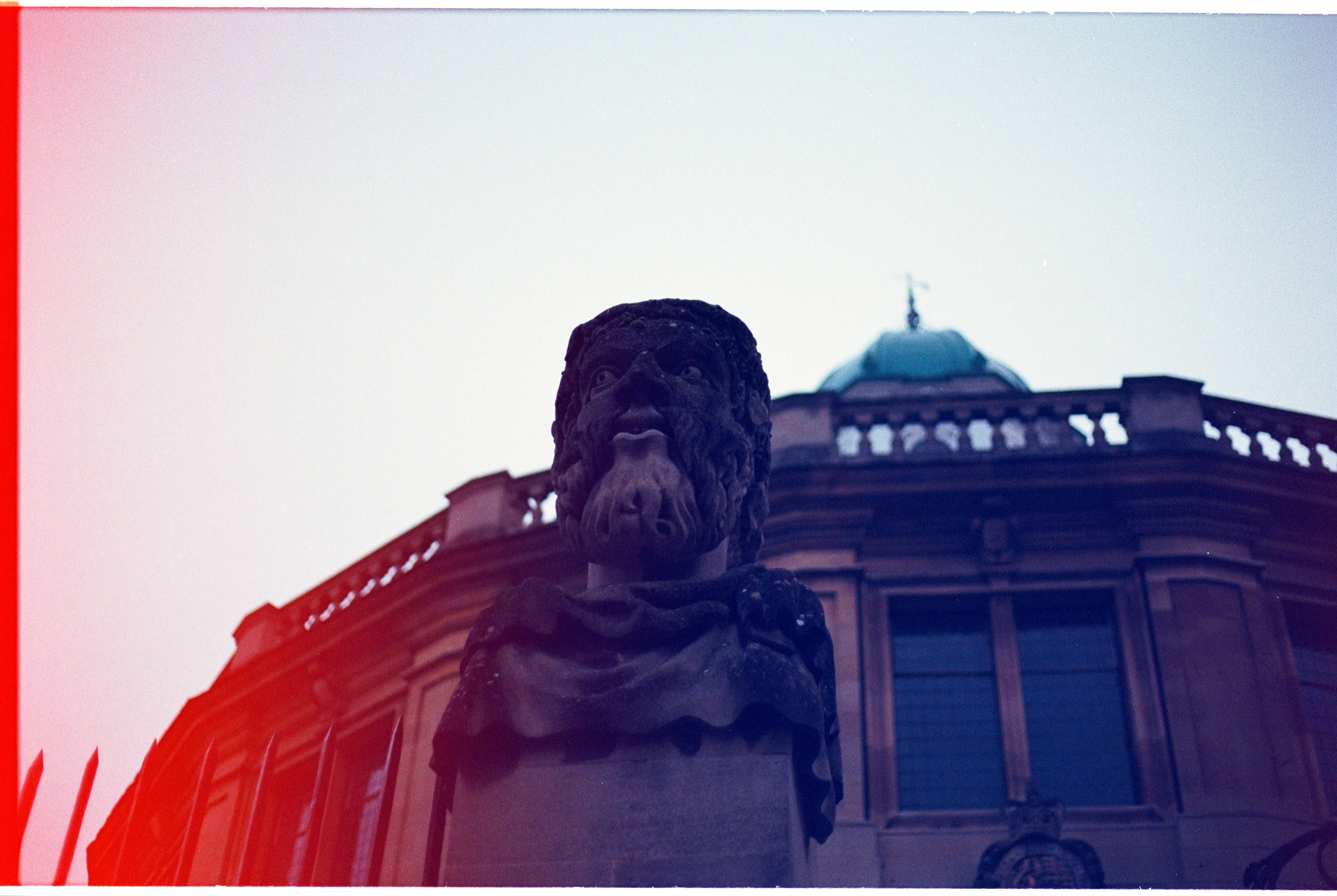 Stone Sentinel Under a Rust-Red Skies