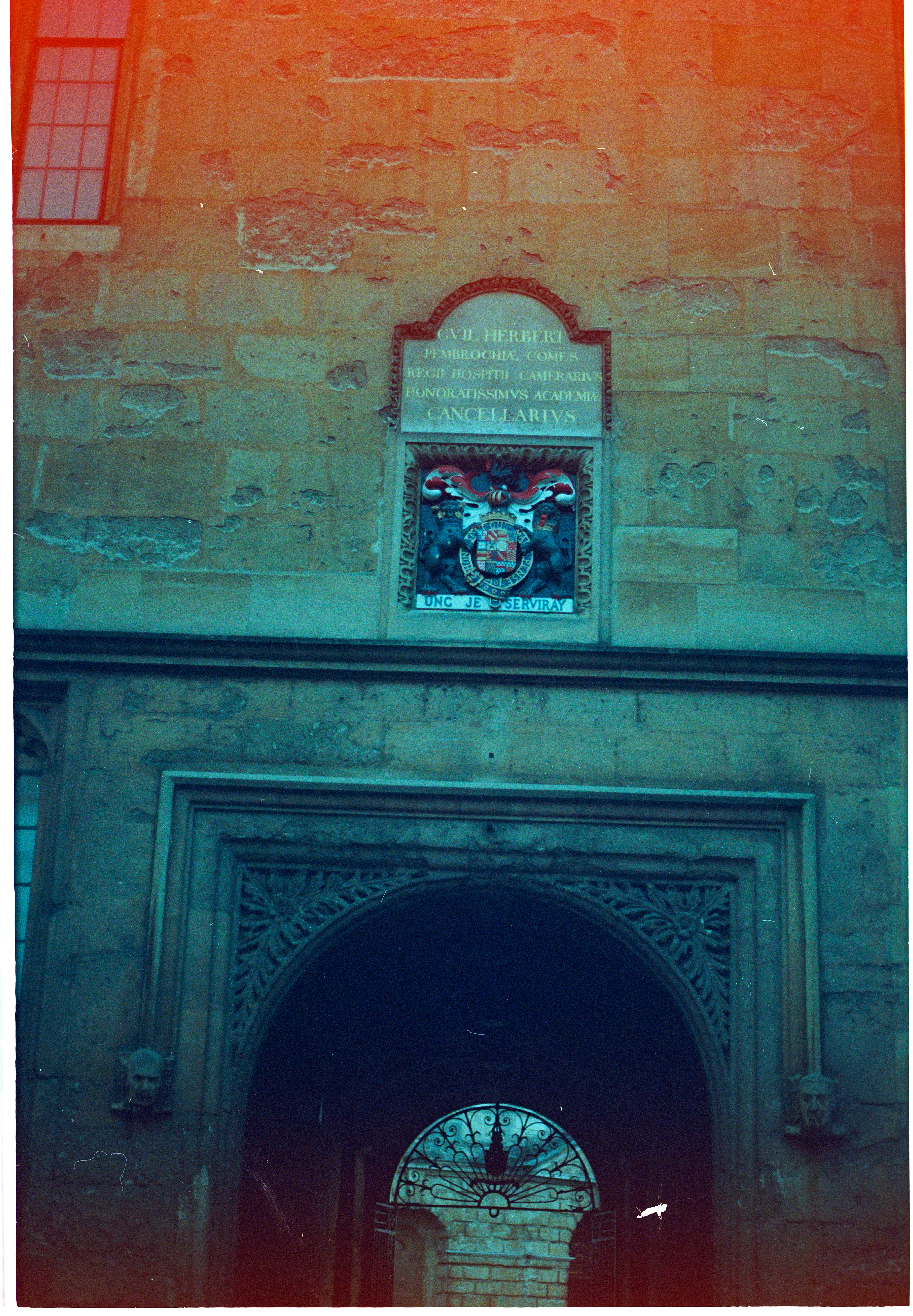 Gate of Time: An Archway Beneath a Fading Coat of Color