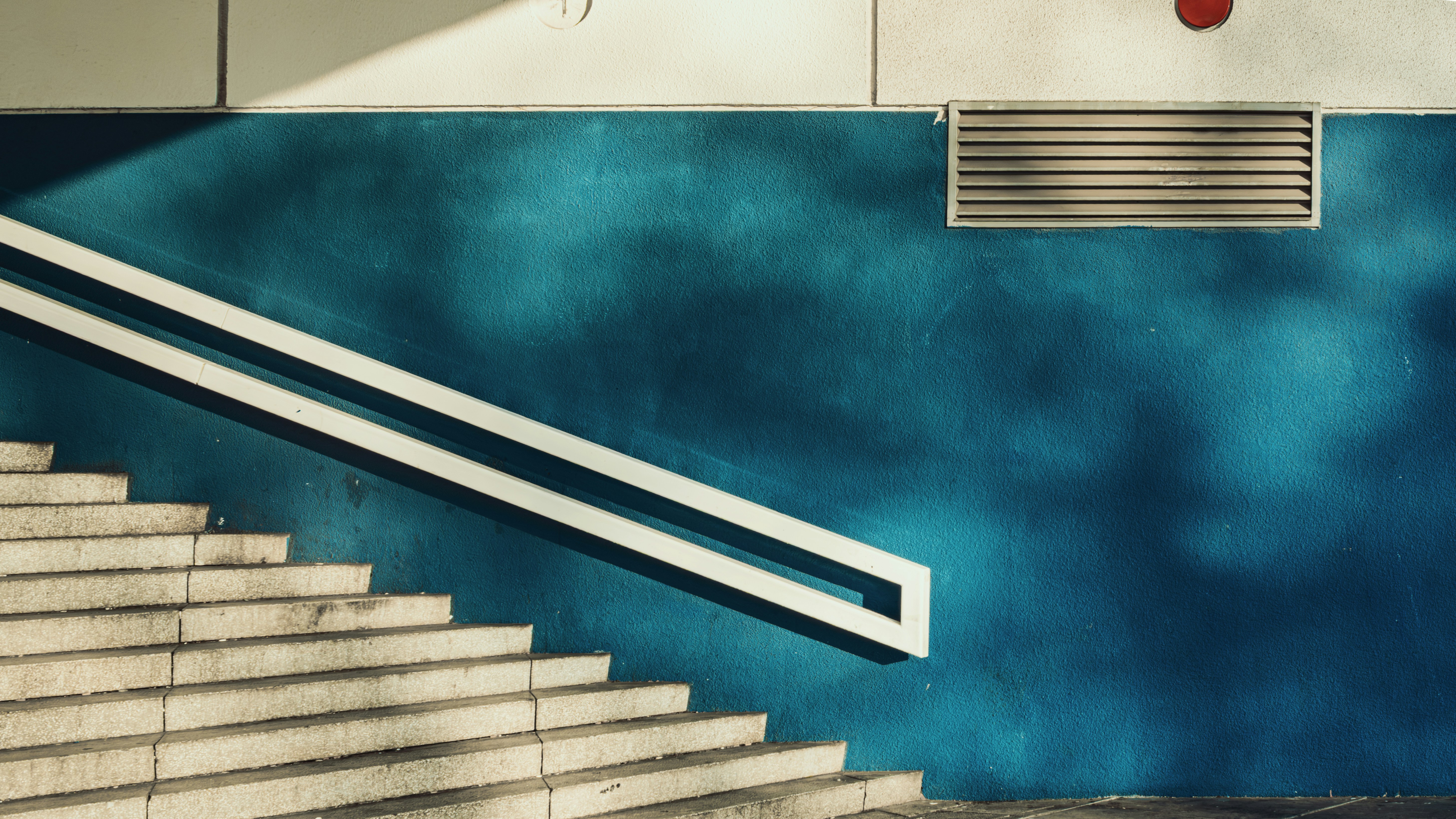 Blue Wall, White Stairs: A Diagonal Conversation with Light