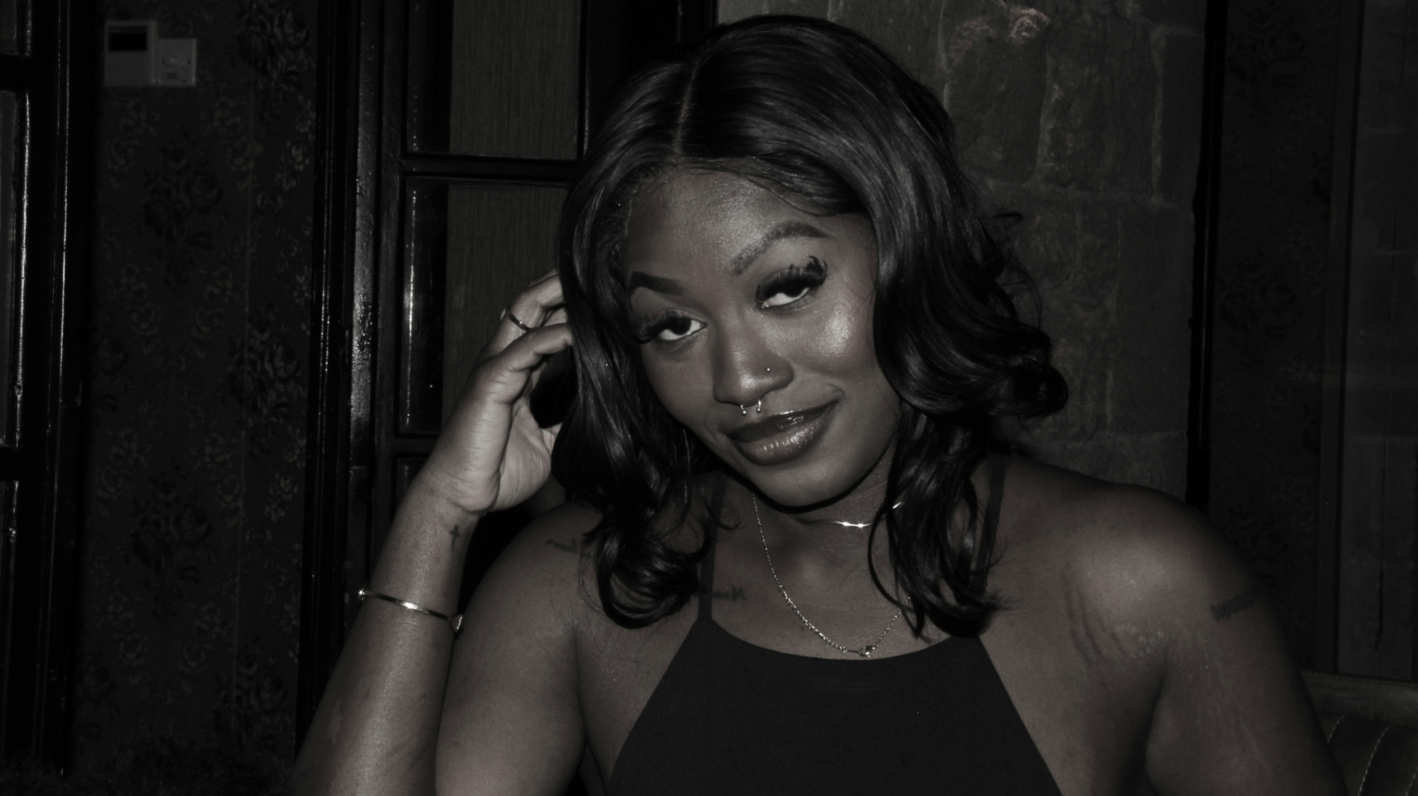 Evening Velvet: A Confident Smile in Low Light