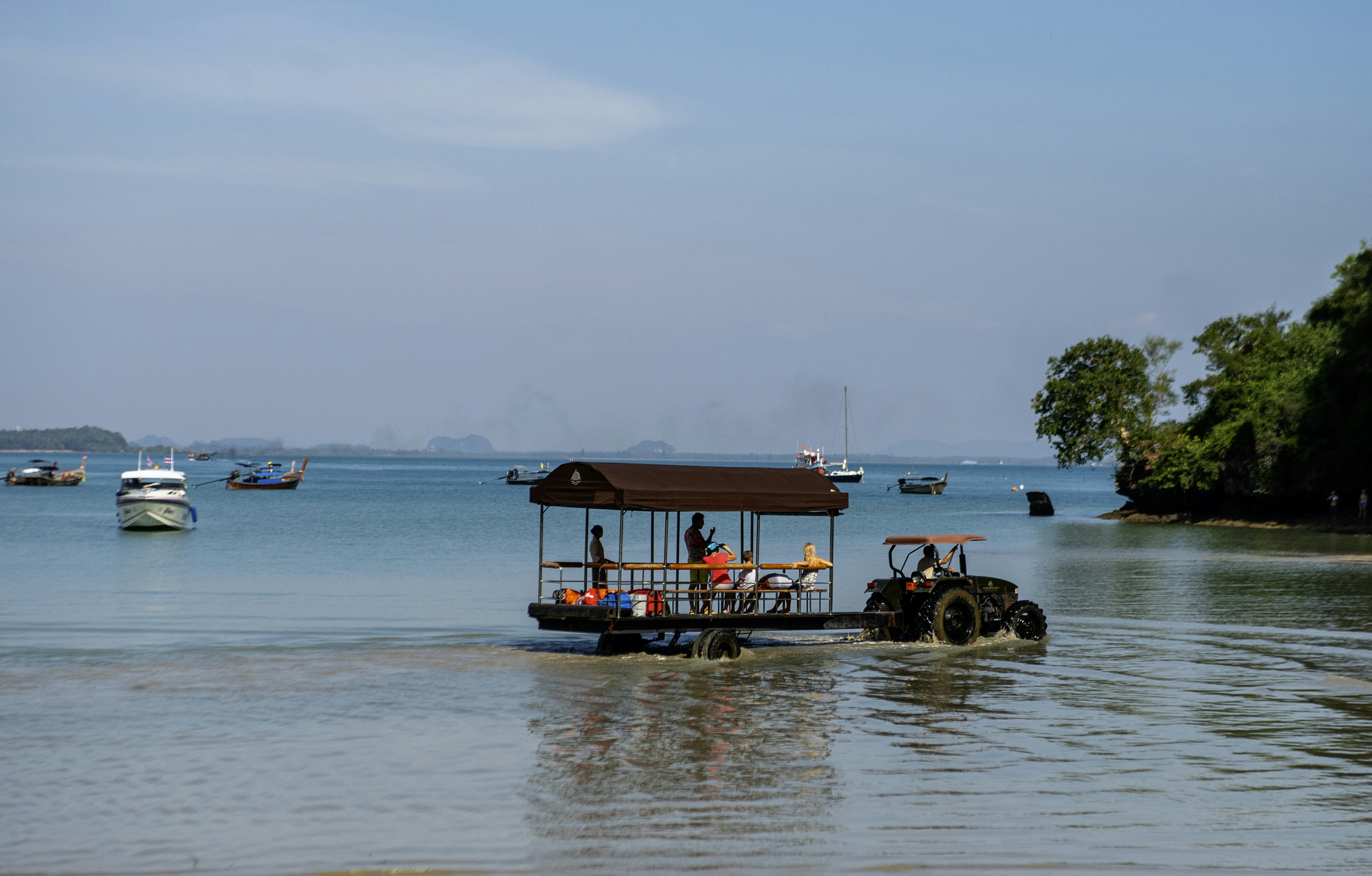 Towed by the Tide: A Riverside Caravan of Bayou Boats