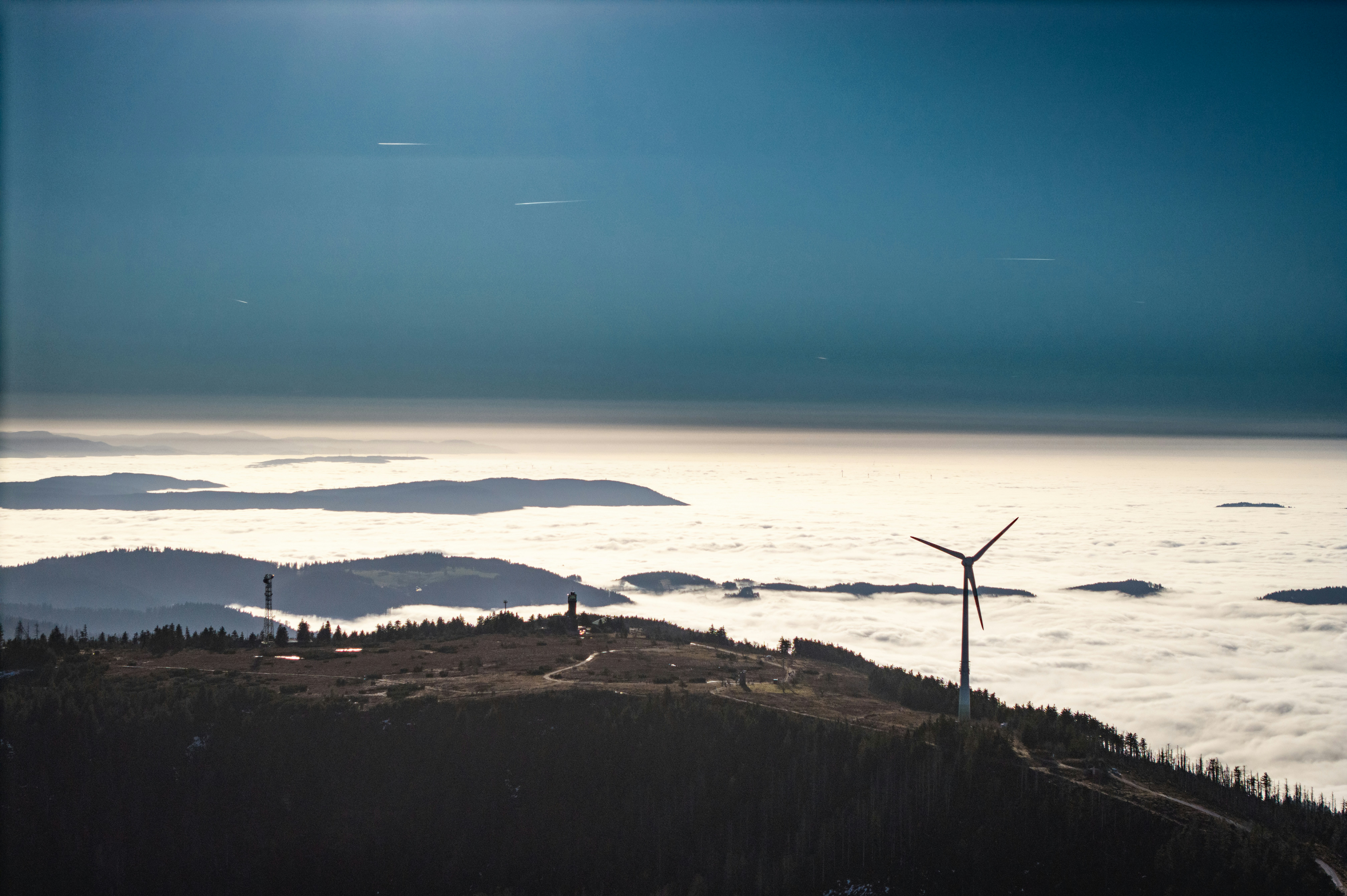 Wind Turbine on a Coastal Ridge Above a Sea of Clouds