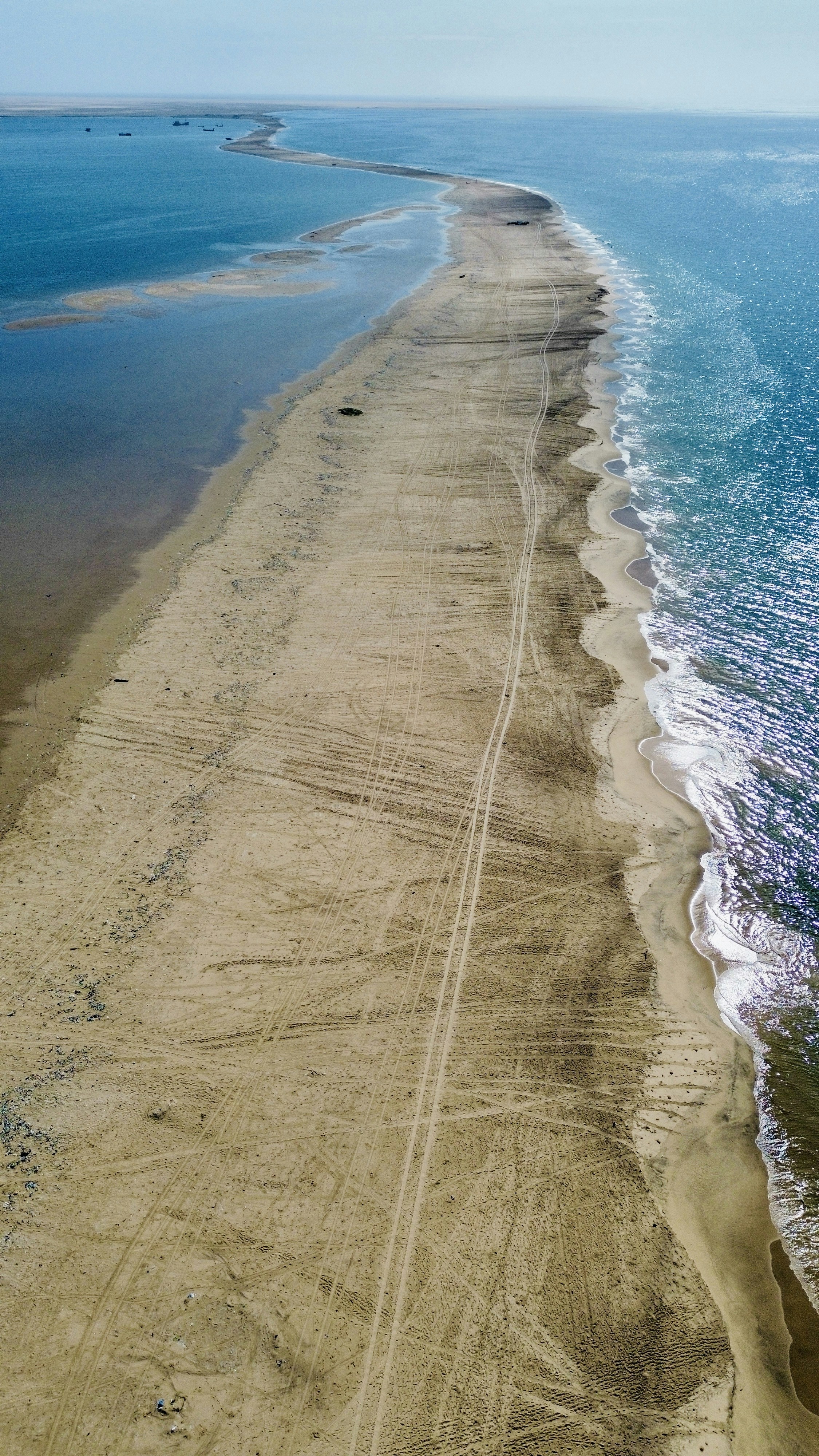 Long Beach Ribbon: An Aerial Dawn Over a Narrow Sandbar