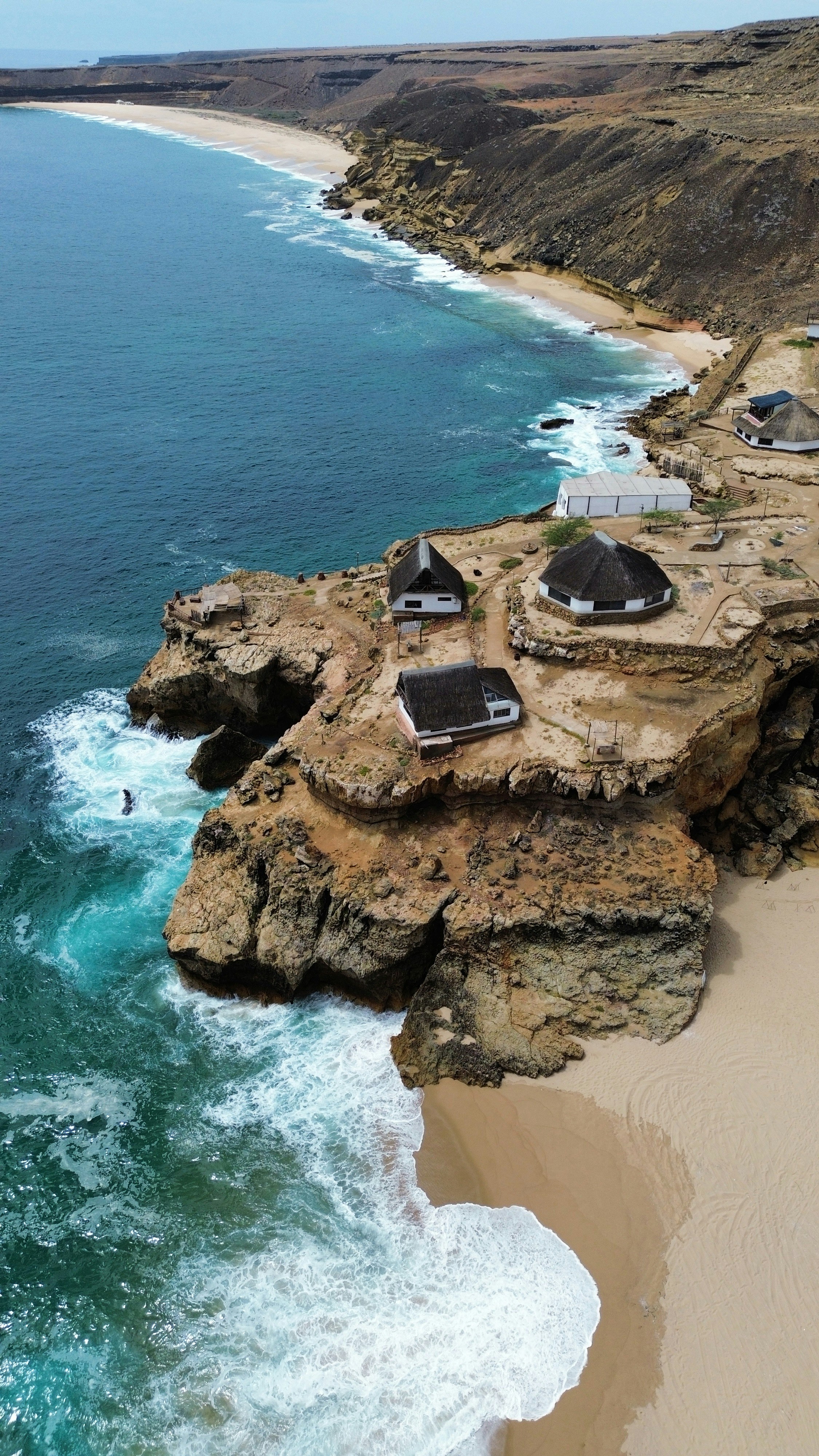 Cliffside Retreat: Rugged Rocks and Tidepool Cabins Overlooking the Atlantic