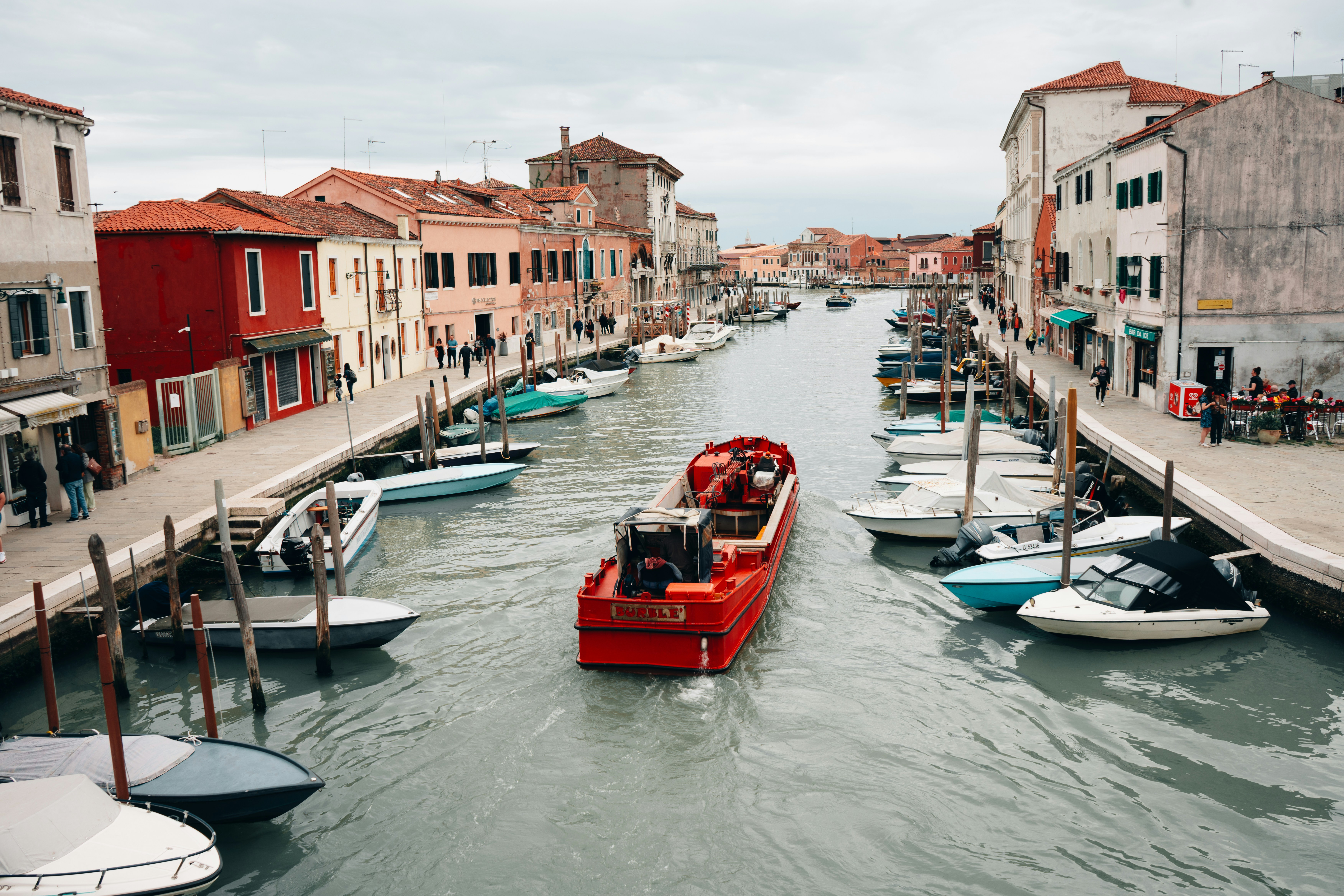 Red Boat Center Stage: A Venetian-Style Canal Under Soft Afternoon Light