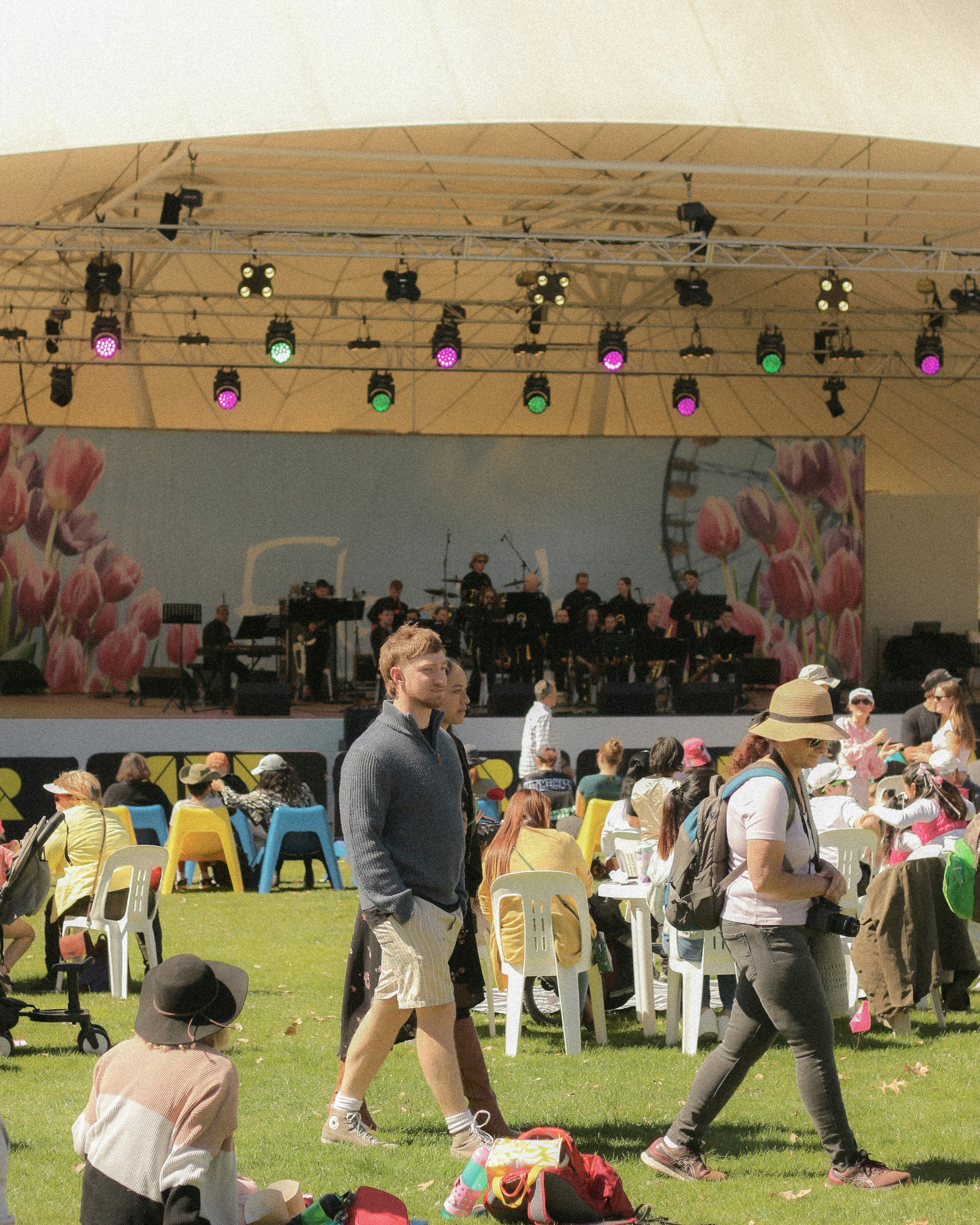 People enjoying an outdoor concert with a band on stage. photo – Free ...