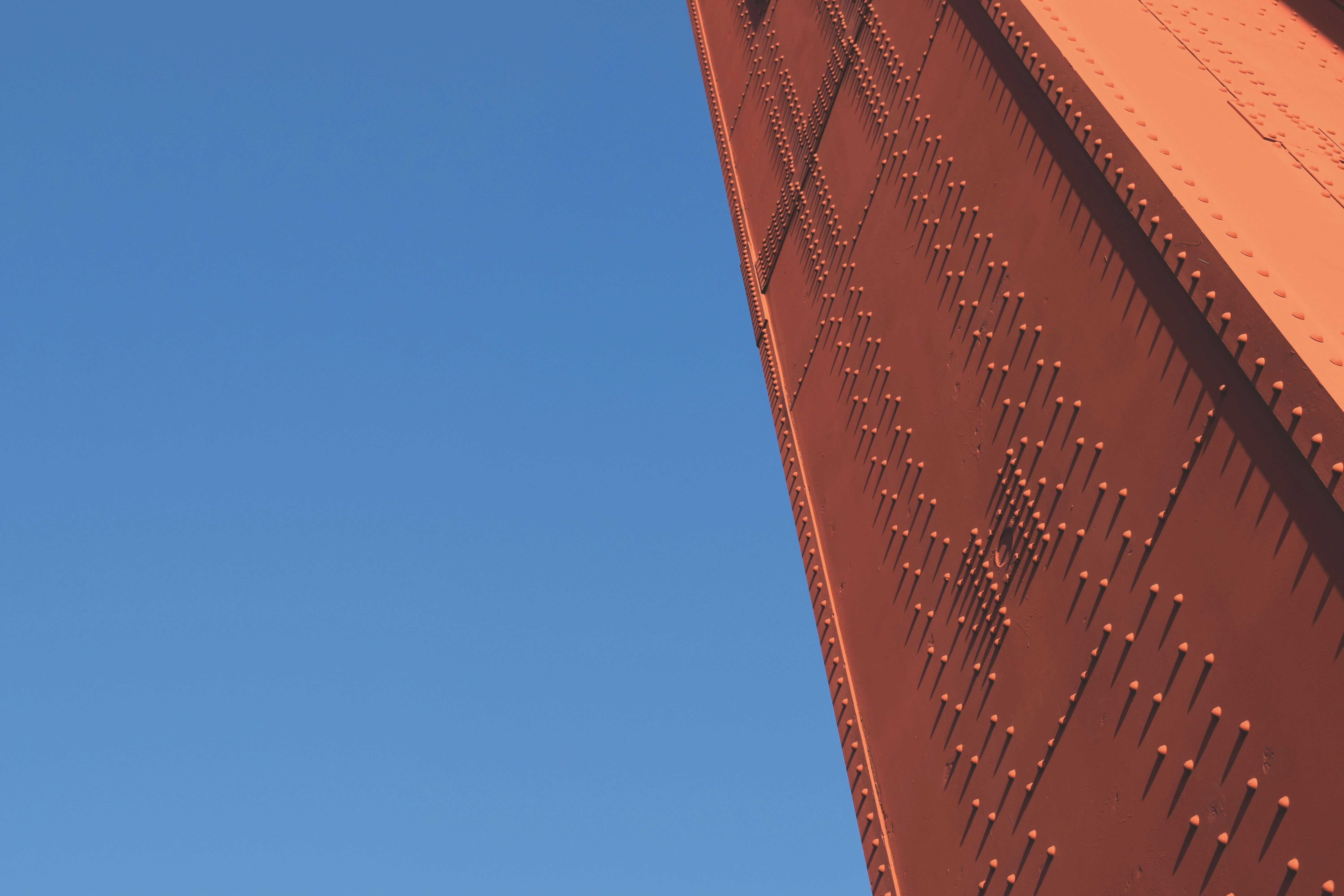 Crimson Truss Corner against a Clear Sky