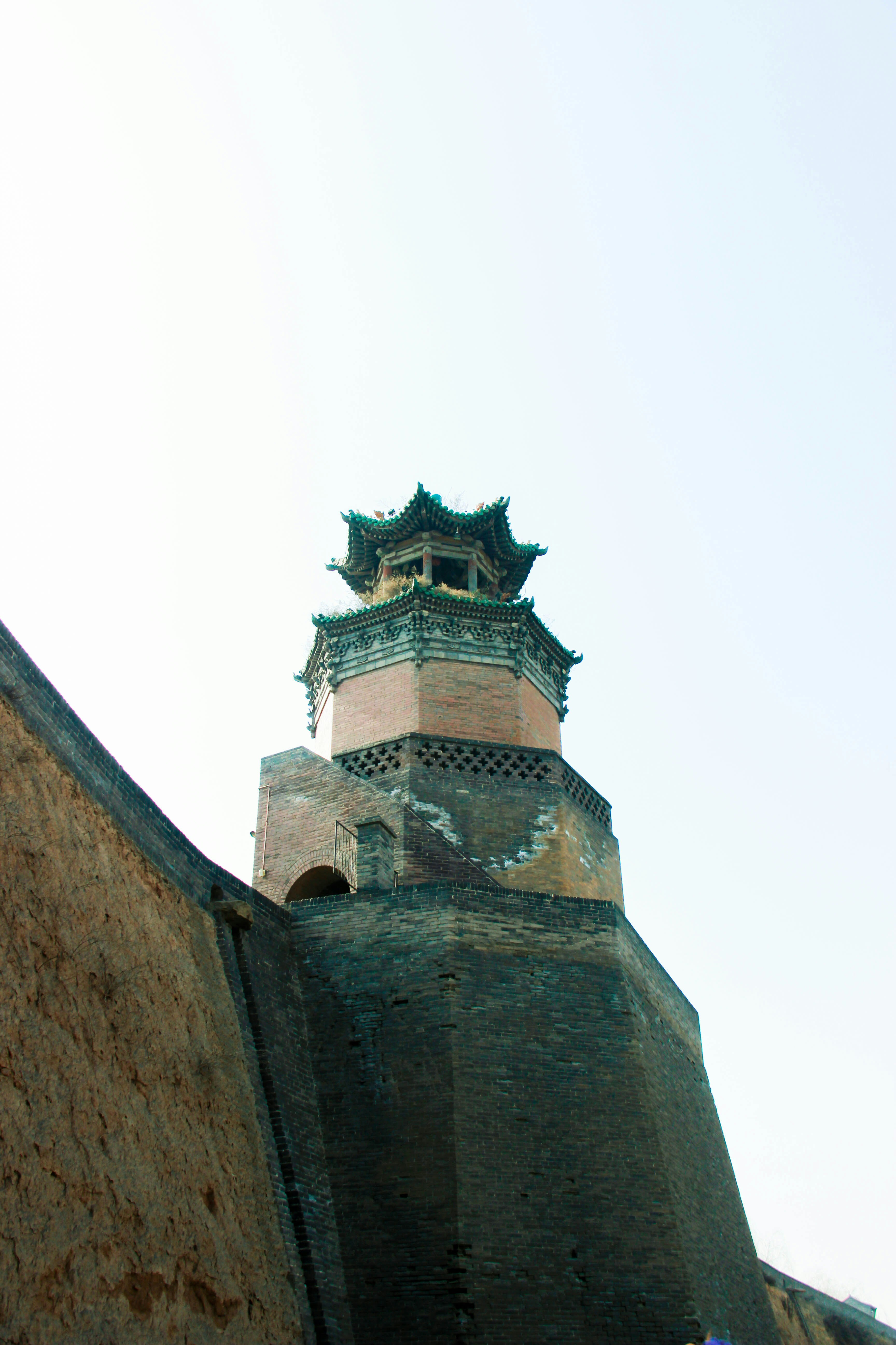 Earthen Watchtower Rising Above the Old City Walls