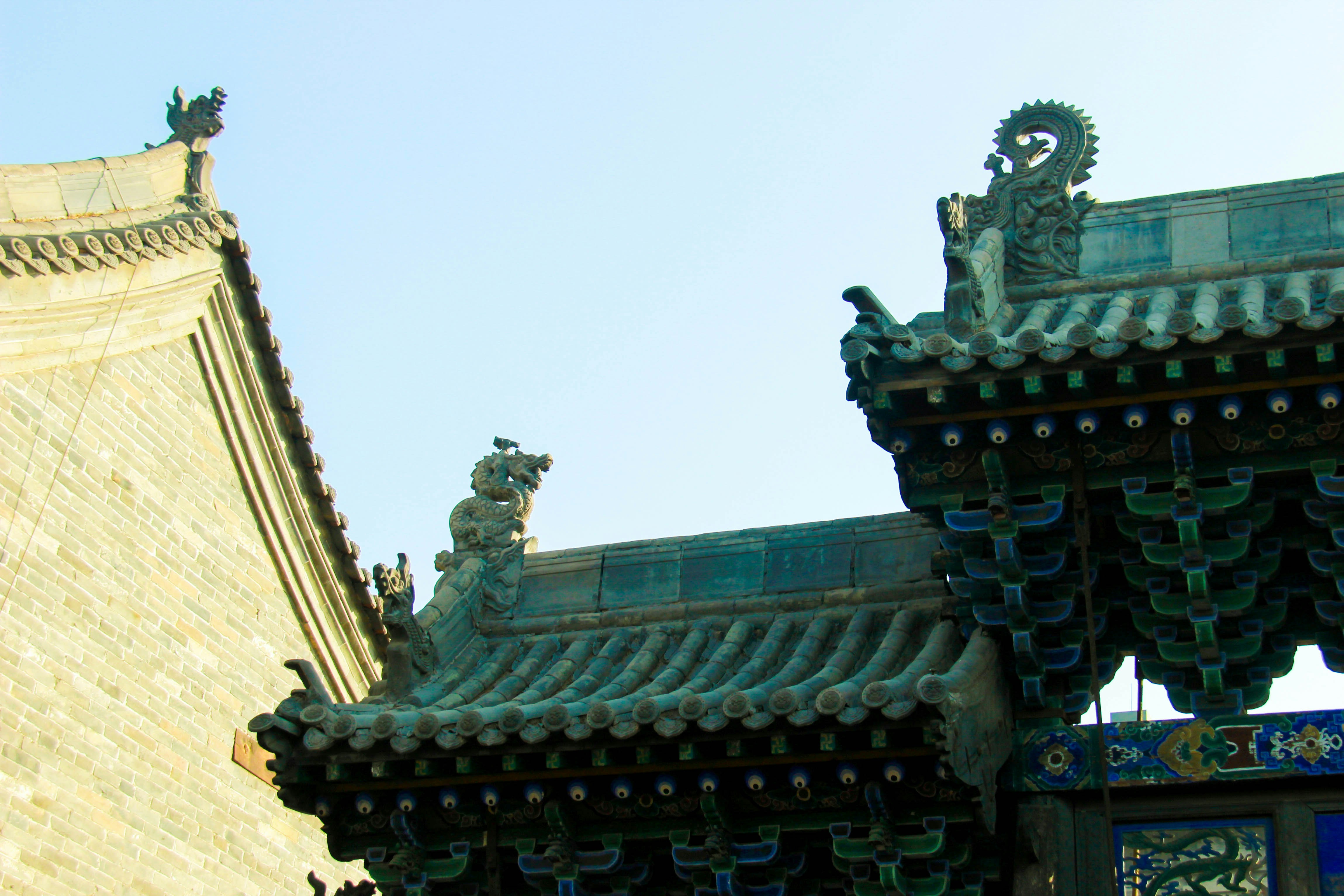 Ceremonial Roofline at Dusk: A Glimpse of Ornate Chinese Architecture