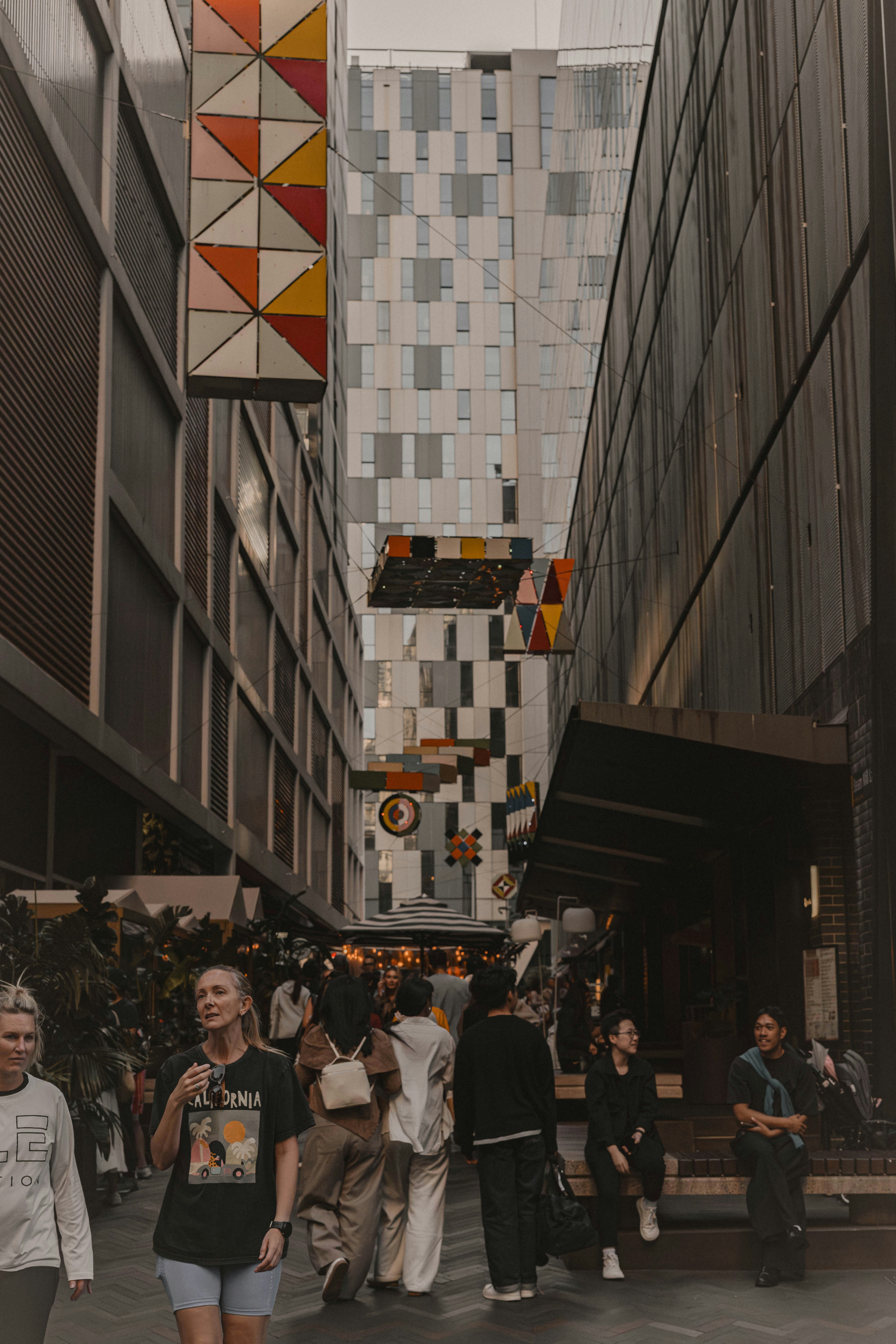 Urban Forest of Faces: Street Amid Geometric Facades