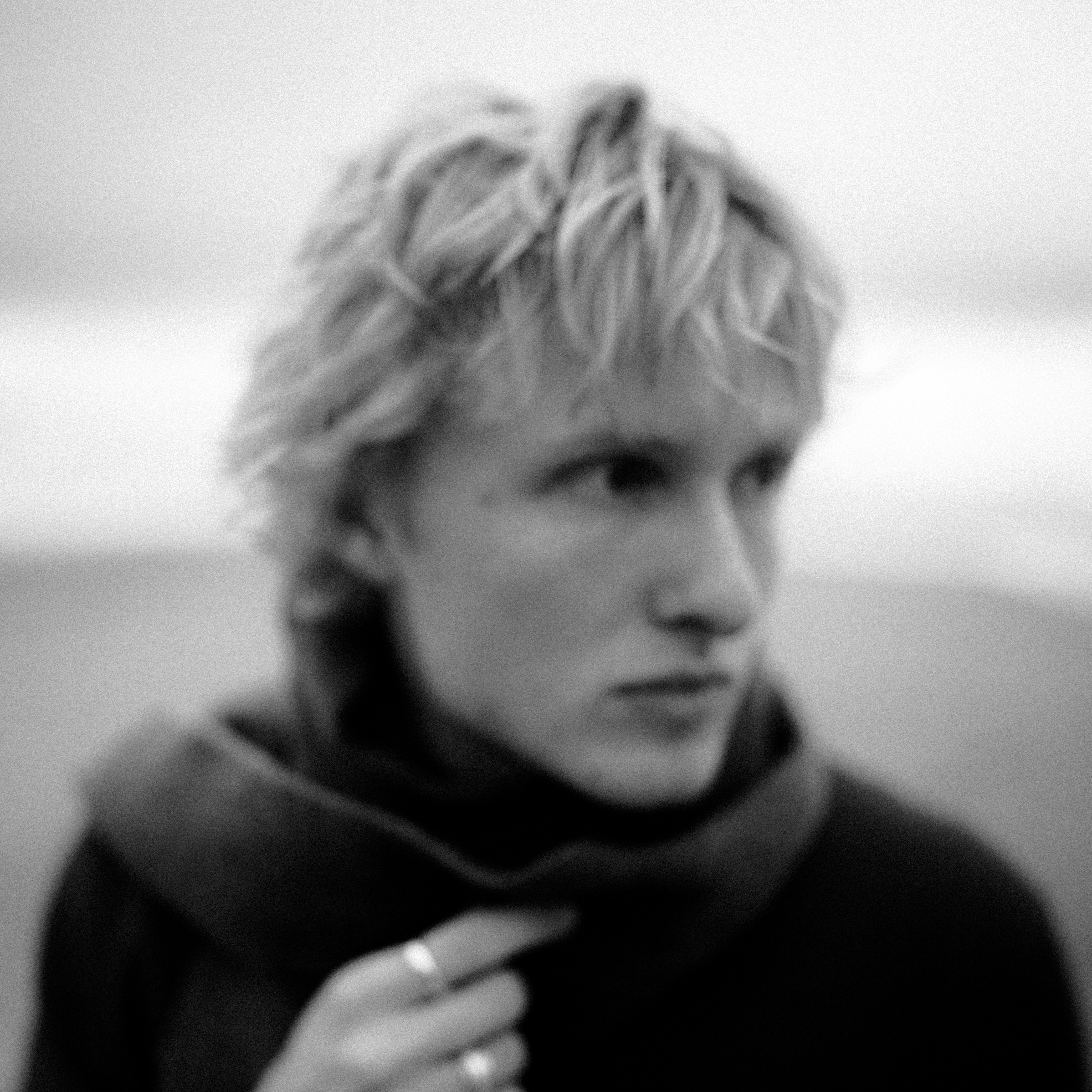 Soft Focus Portrait in Mono: A Quiet Gaze in the Wind