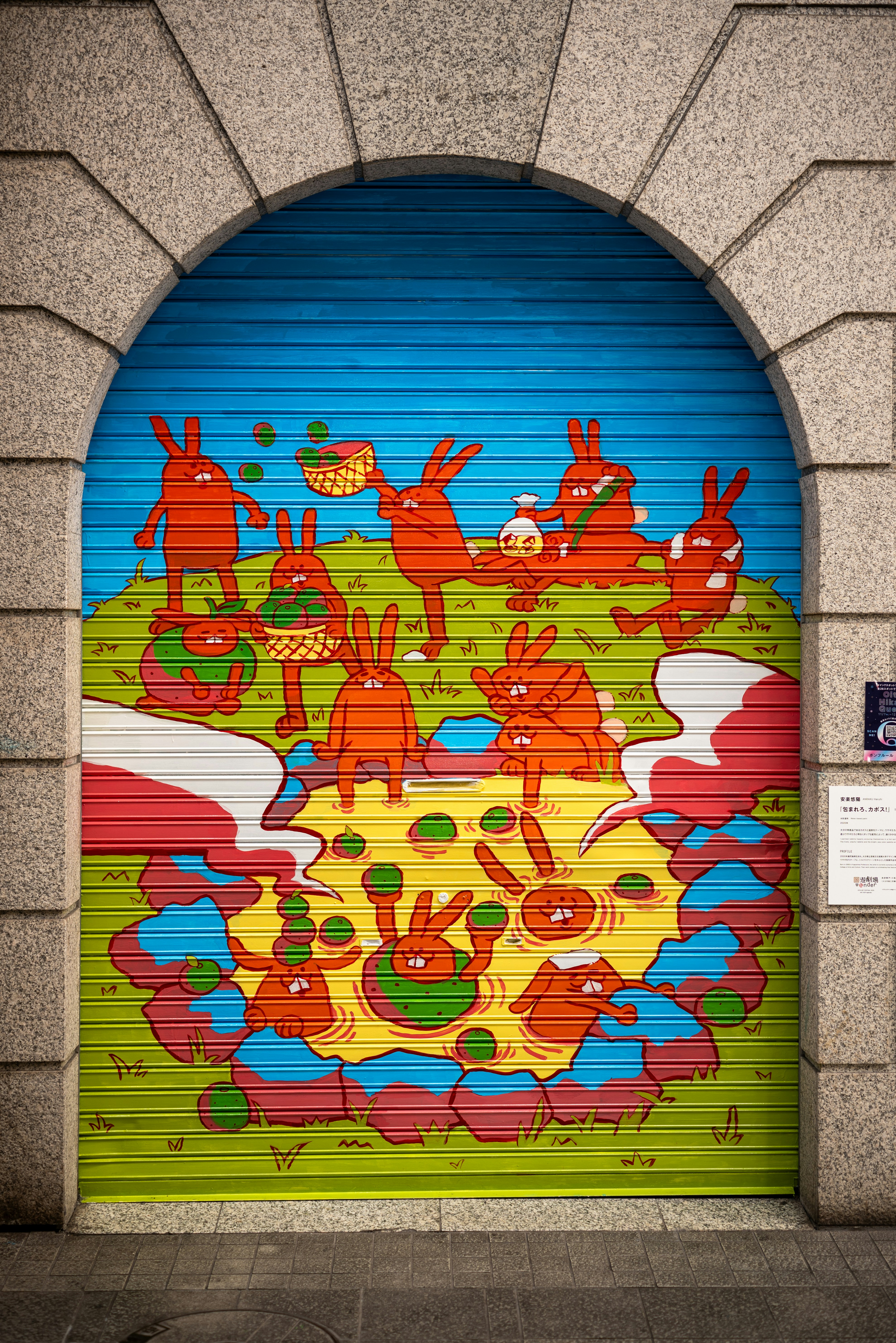 Arcade of Rabbits: A Colorful Graffiti Door in Transit