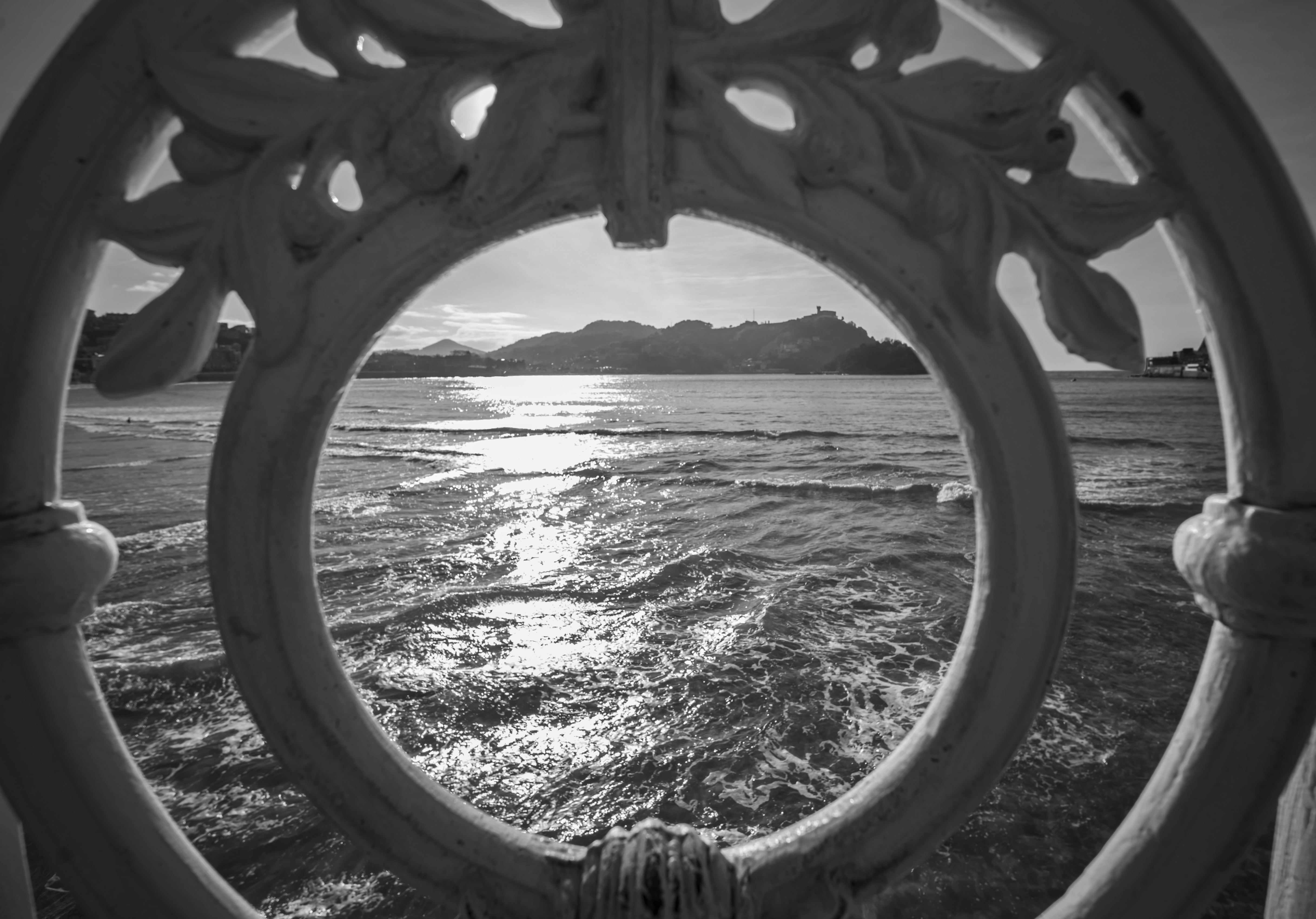 Circular Frame, Open Sea: A Pierced View Through Ornate Metalwork