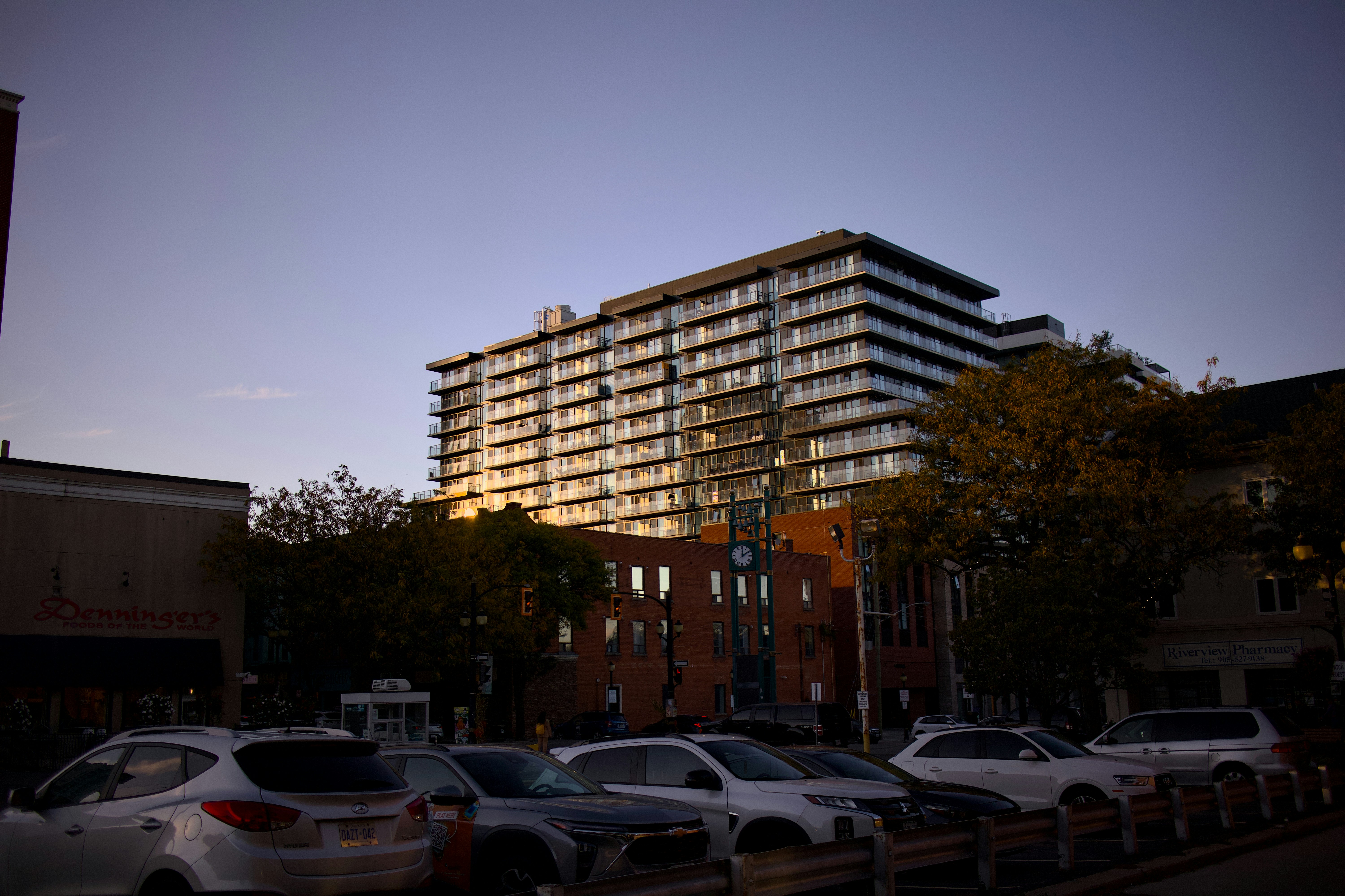 Urban Glass and Brick: Evening Shadows on a modern City Habitat