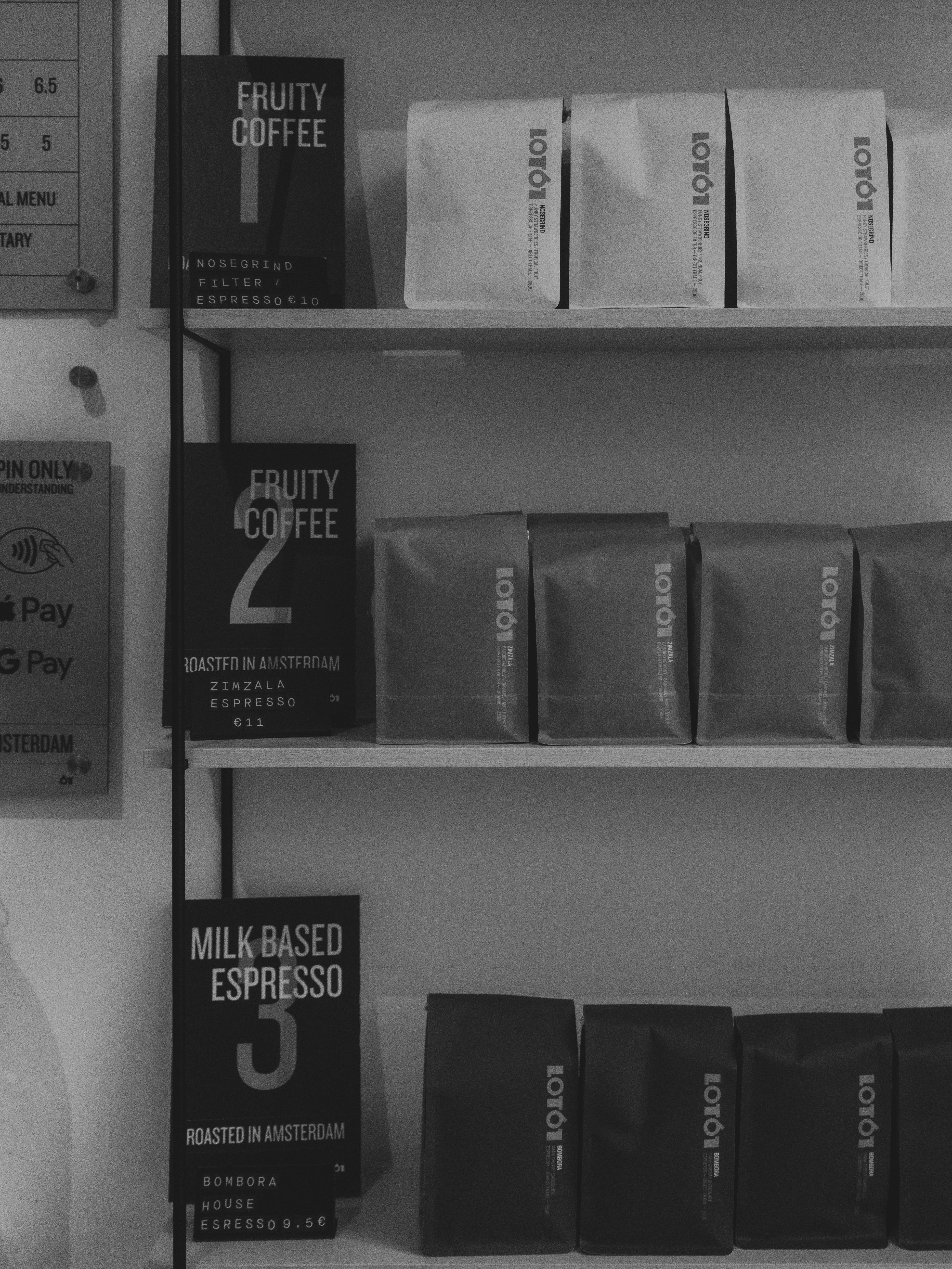 Muted Coffee Aisle: Mono Packets on a Shelf