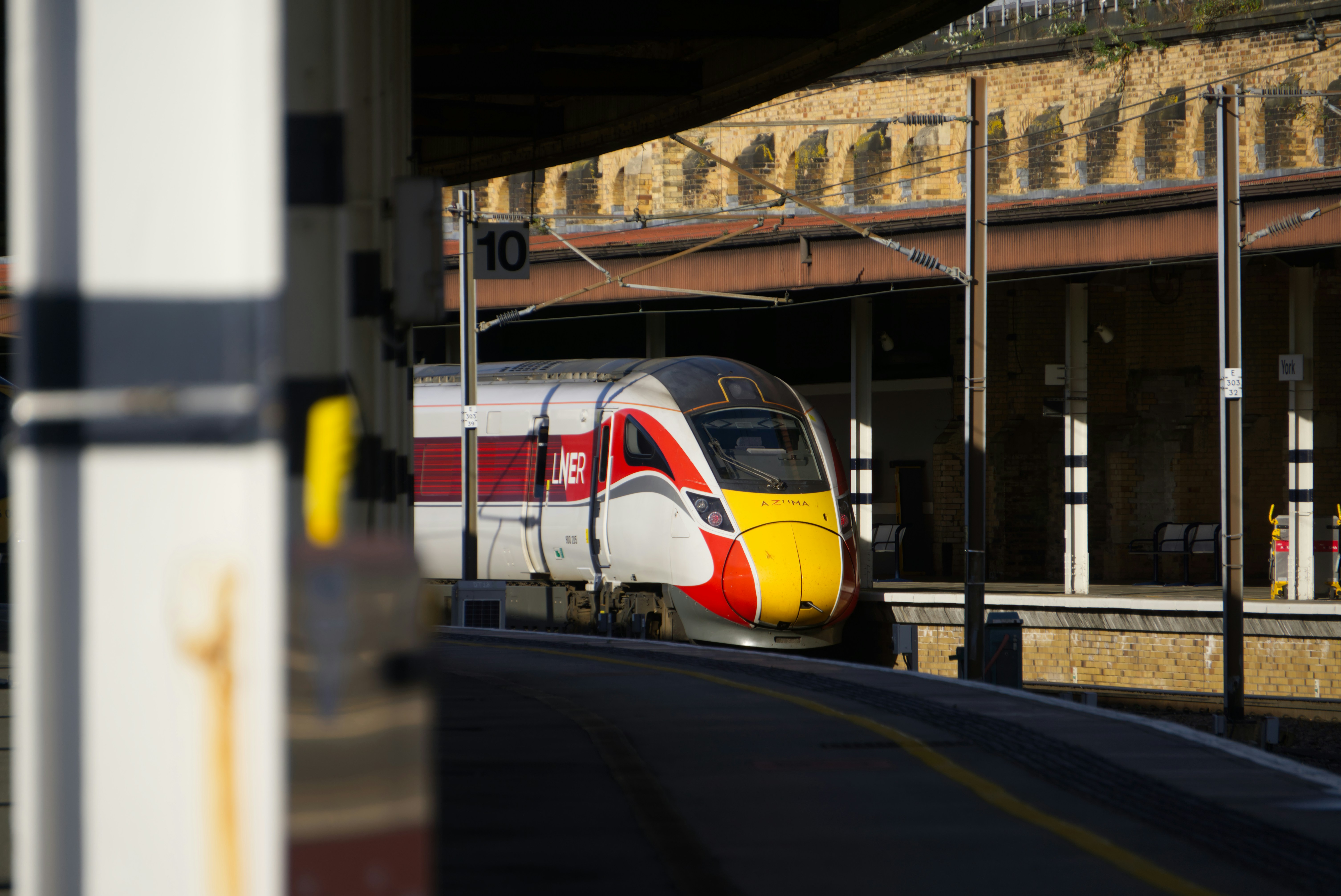 LNER Class 800/2 "Azuma" departing York station platform 9 as the evening approaches.