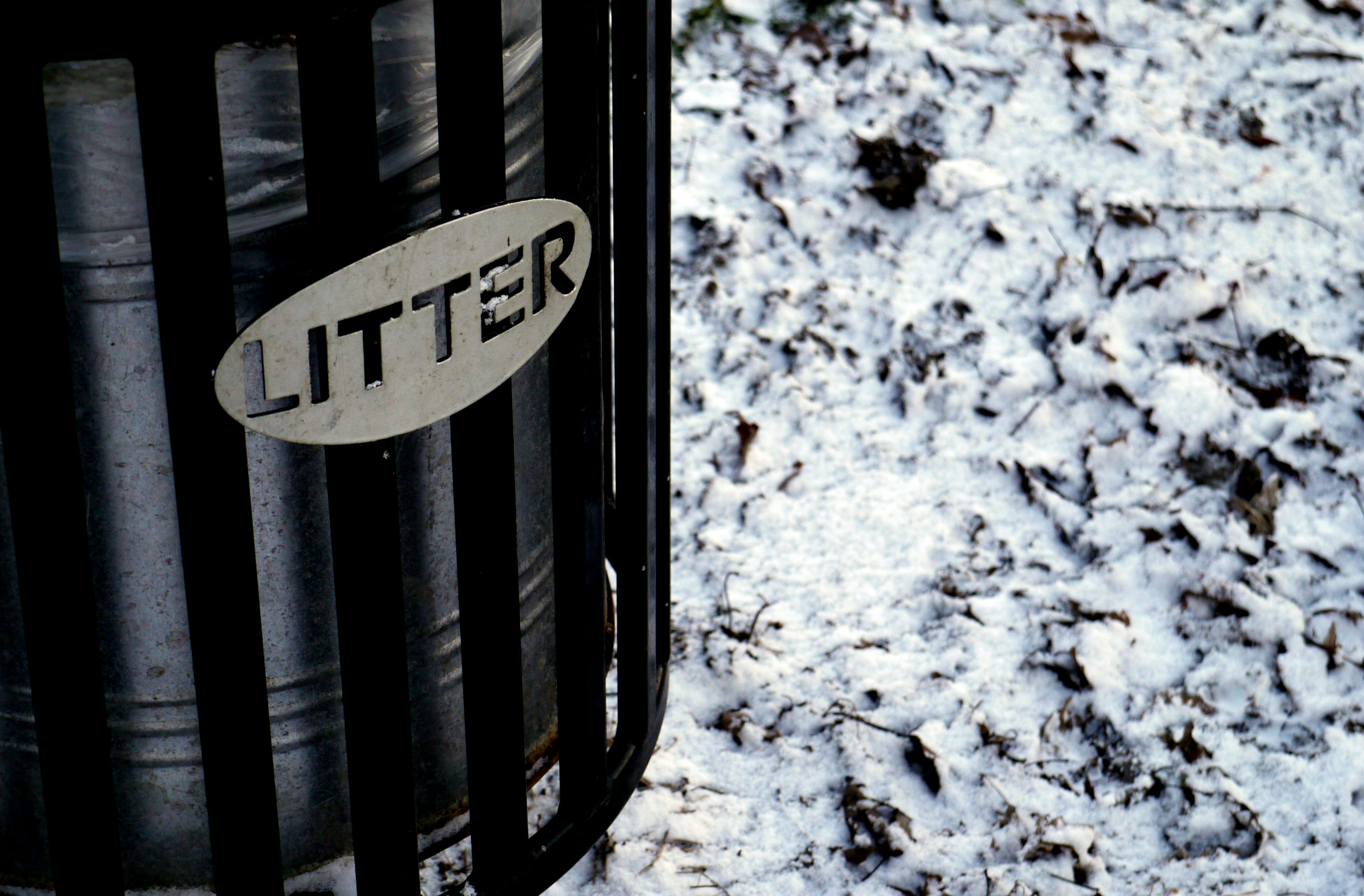 A litter bin in the snow