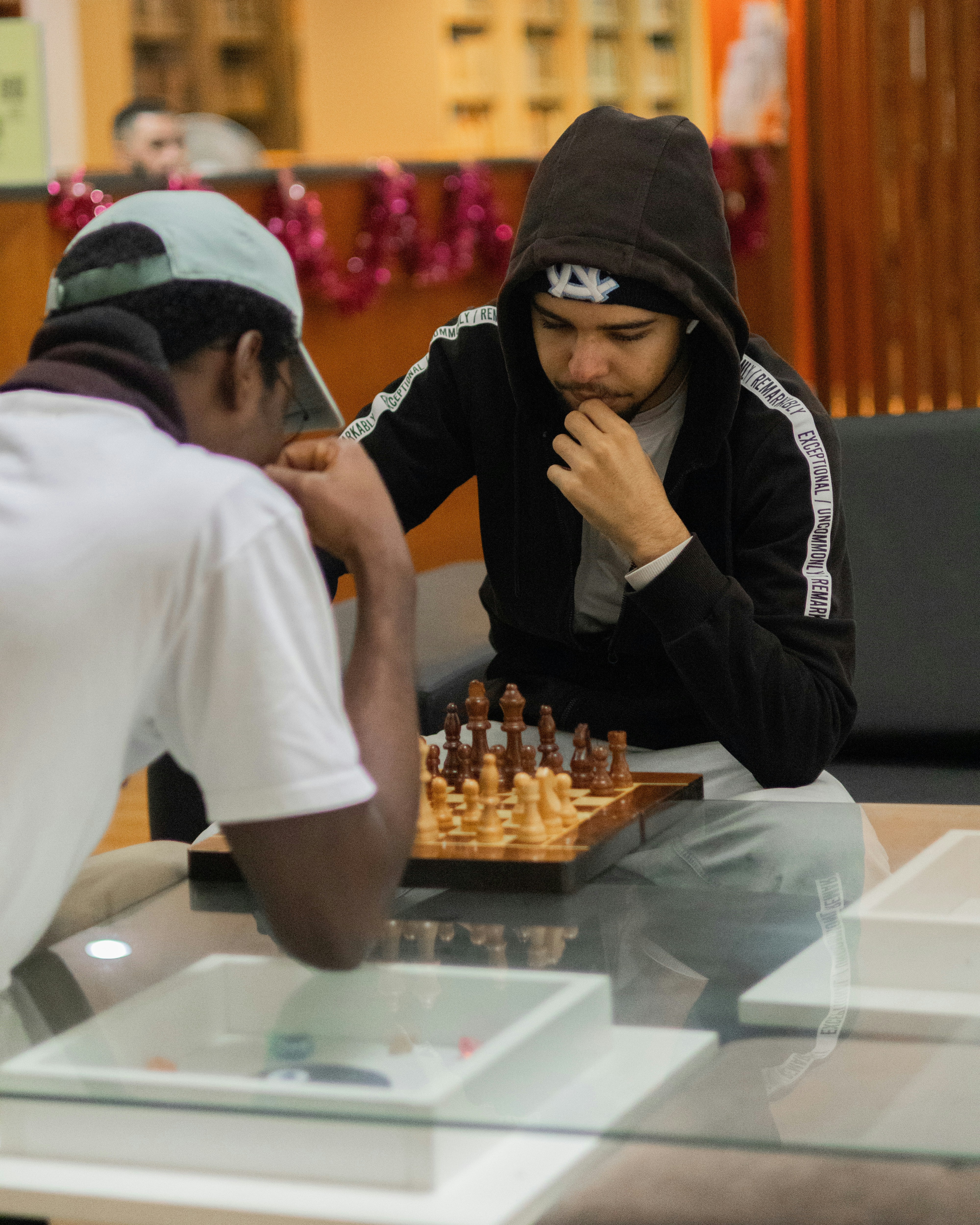 Concentration at the Chessboard: A Moment of Quiet Strategy