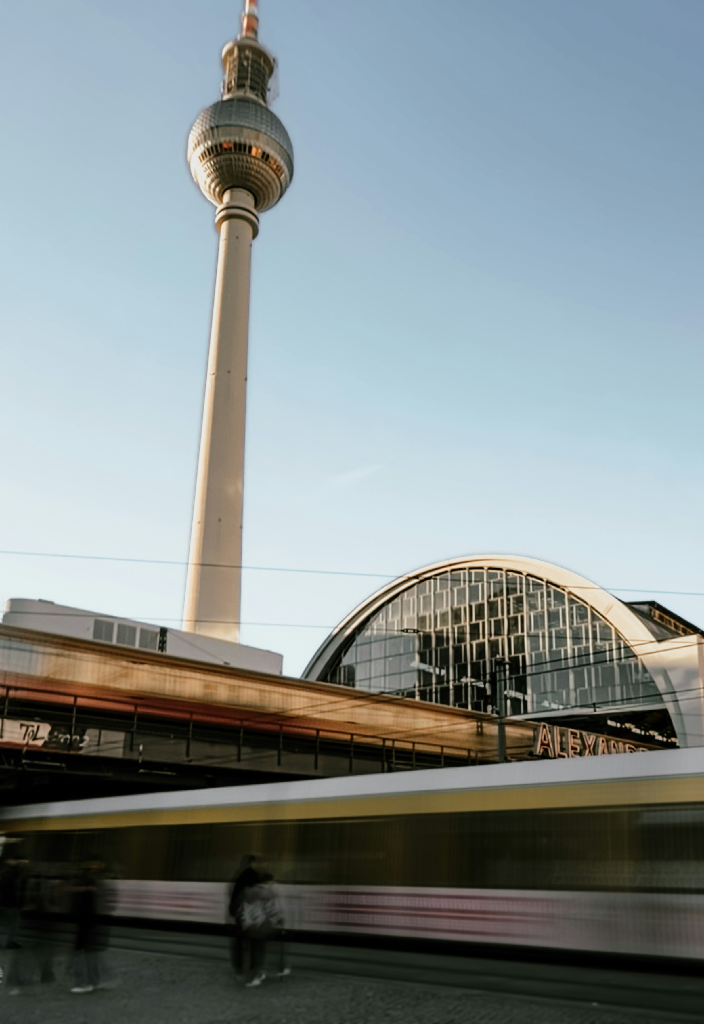 Berlin TV tower and train station with moving trainMaria Molnarova