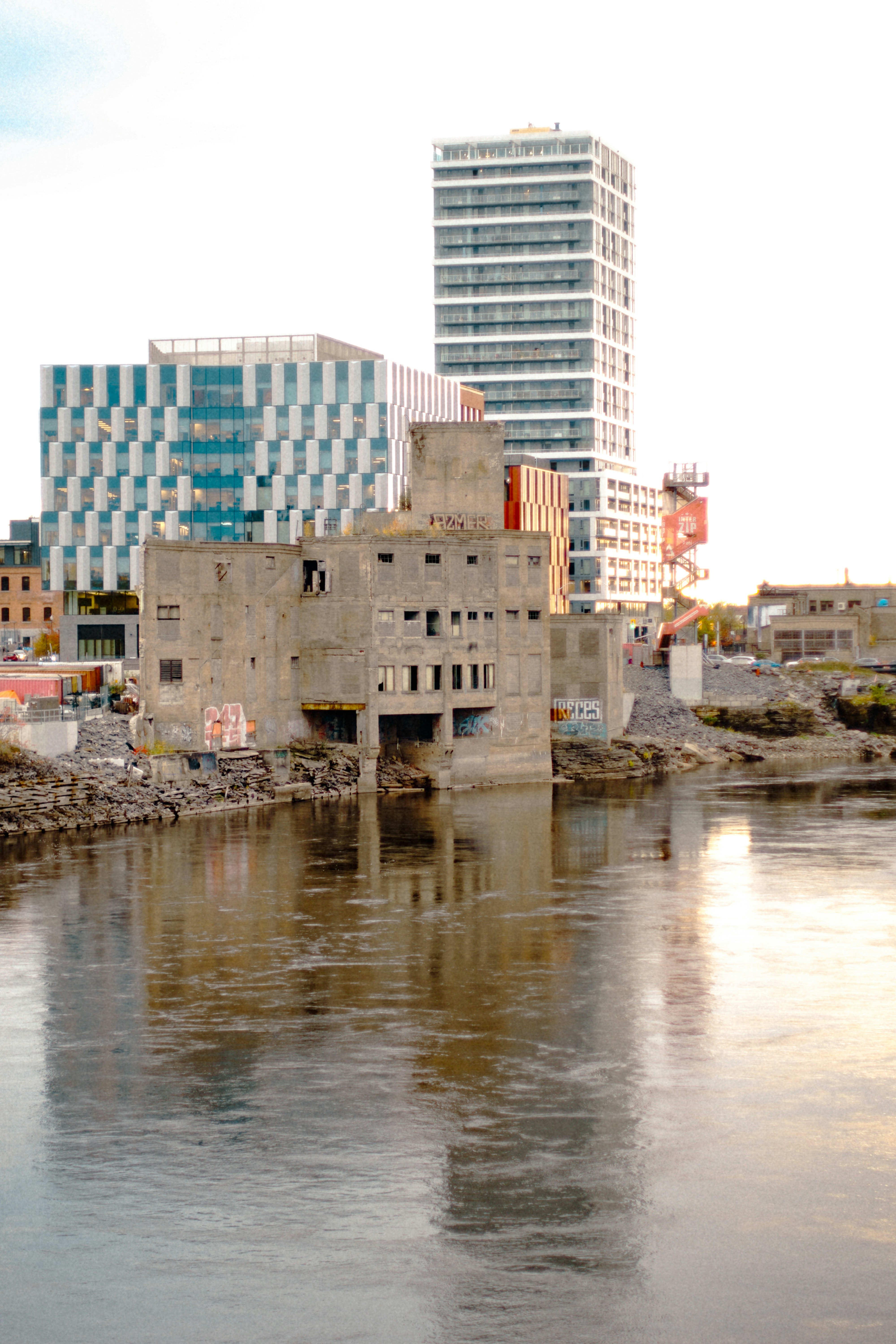 Riverside Quarry: Concrete Towers Rise Over Reflections
