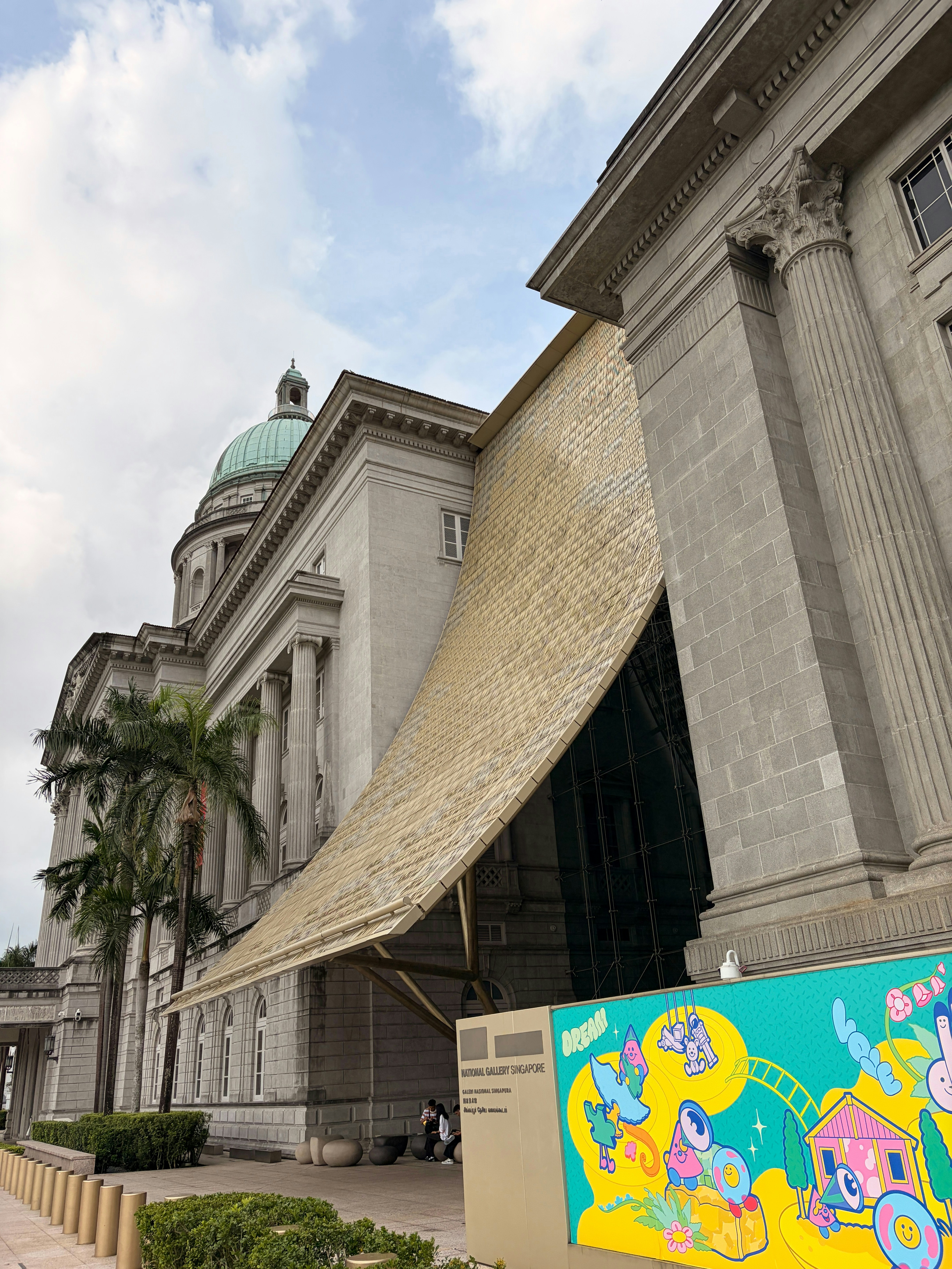 Grand building with unique curved roof installation