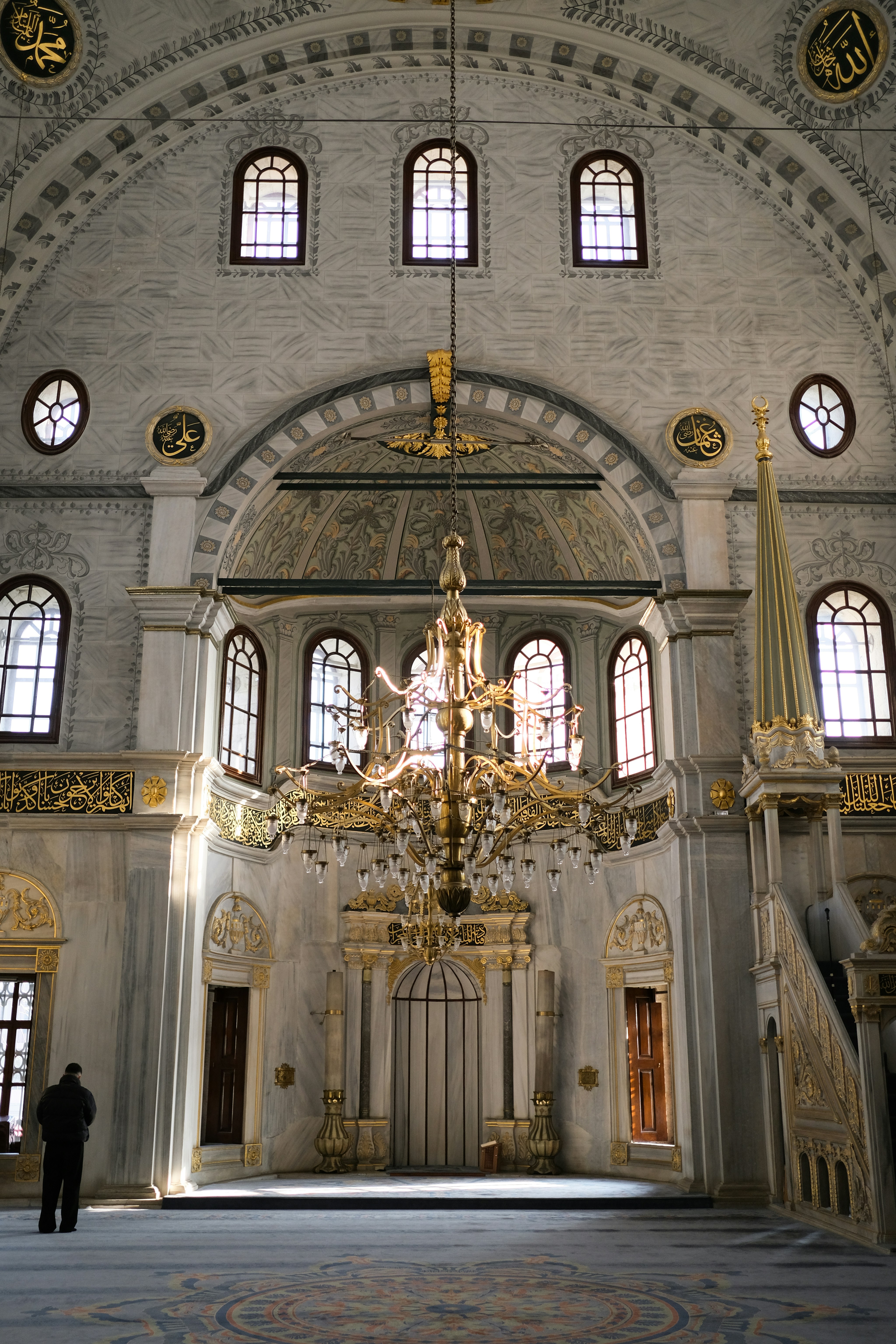 Golden Chandelier Within Marble Mosque Hall