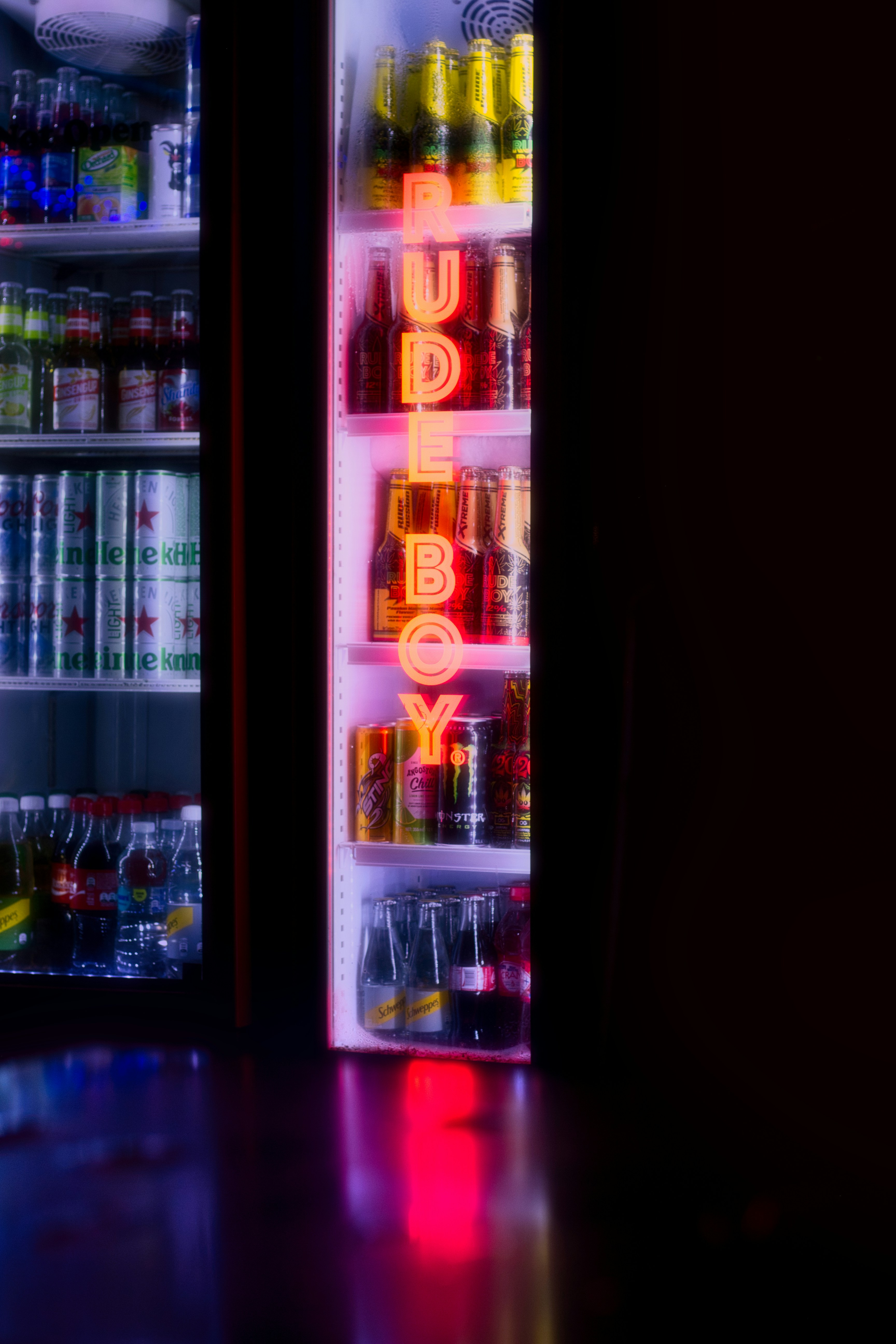 Neon Core: Red Lettering Illuminates a Quiet Cold Store