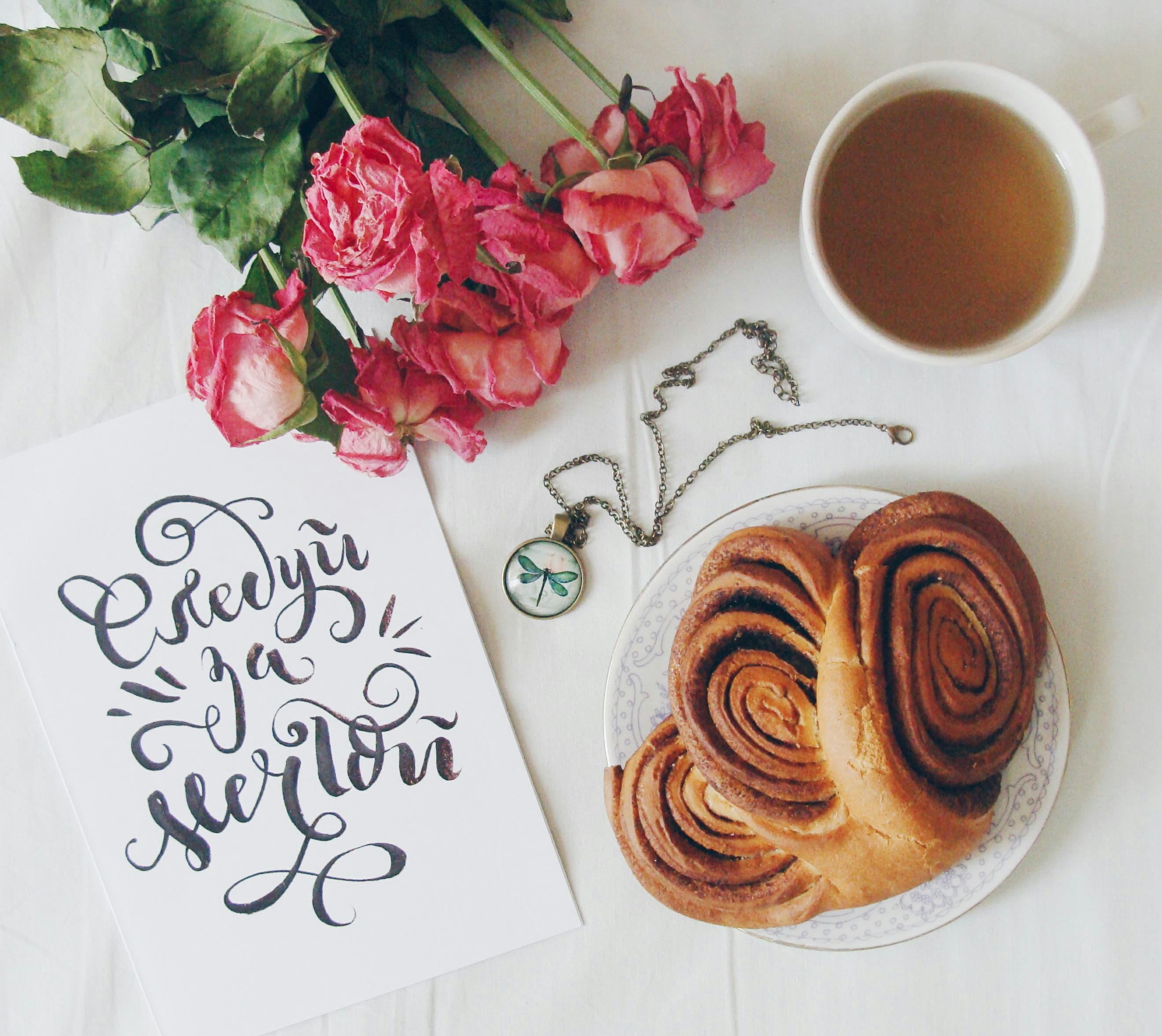 A Quiet Morning Bite: Cinnamon Swirls, Roses, and Tea