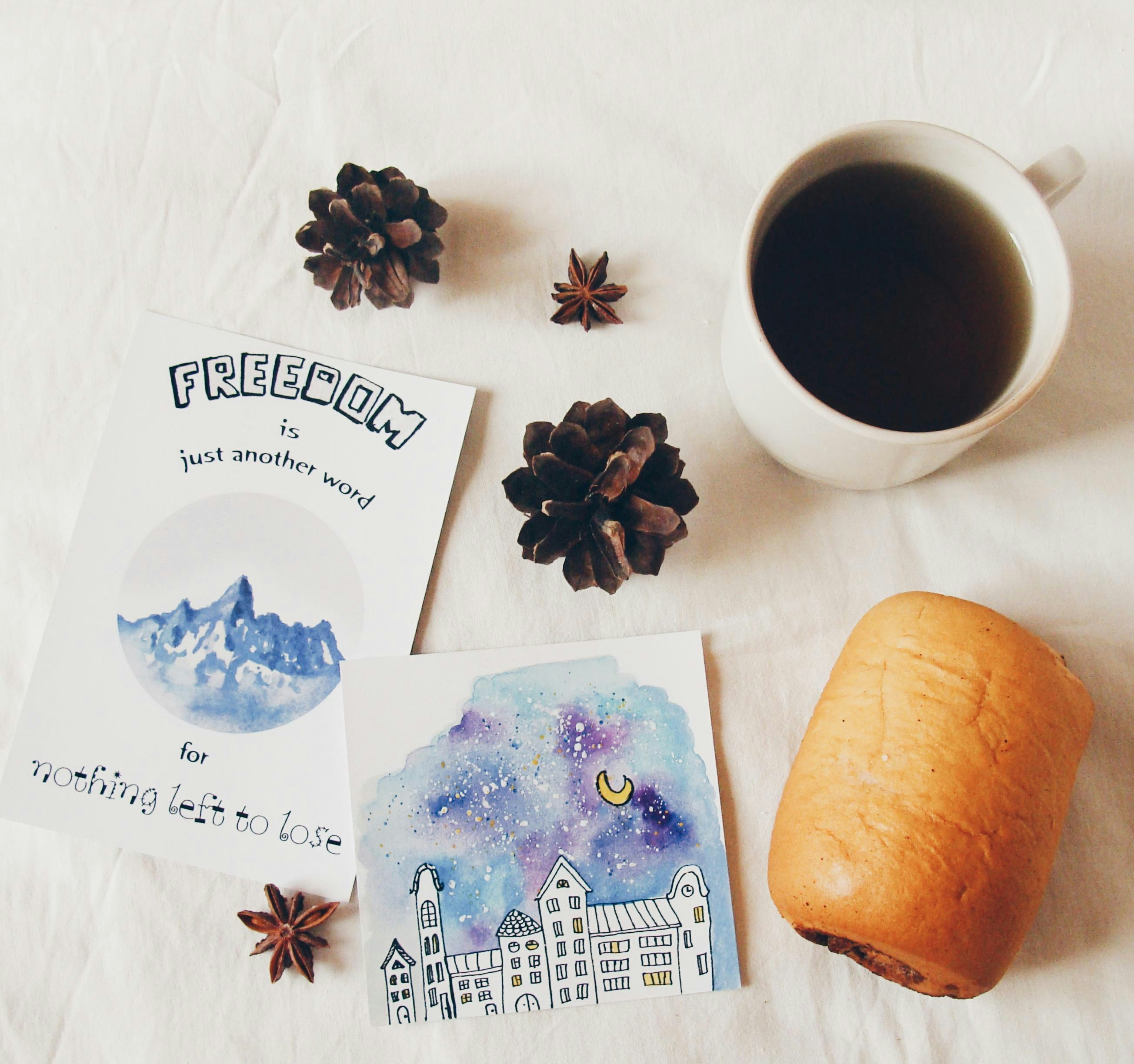 Quiet Morning Still Life: Cup, Cards, and a Pastry