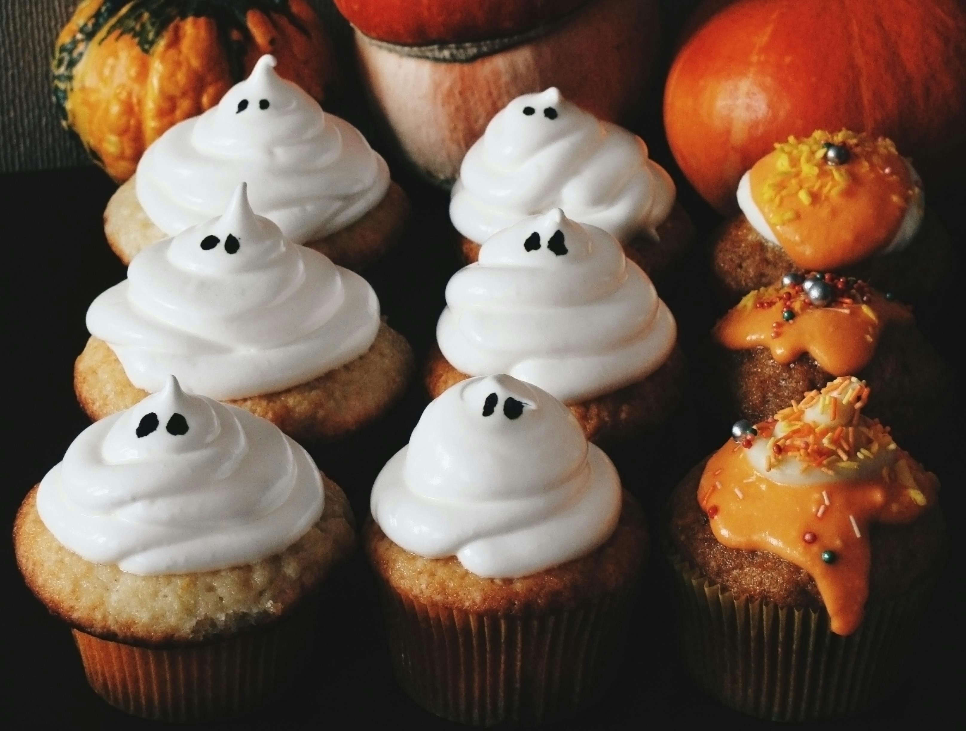 Ghostly Sweet Stack: A Parade of Pumpkin-Top Cupcakes
