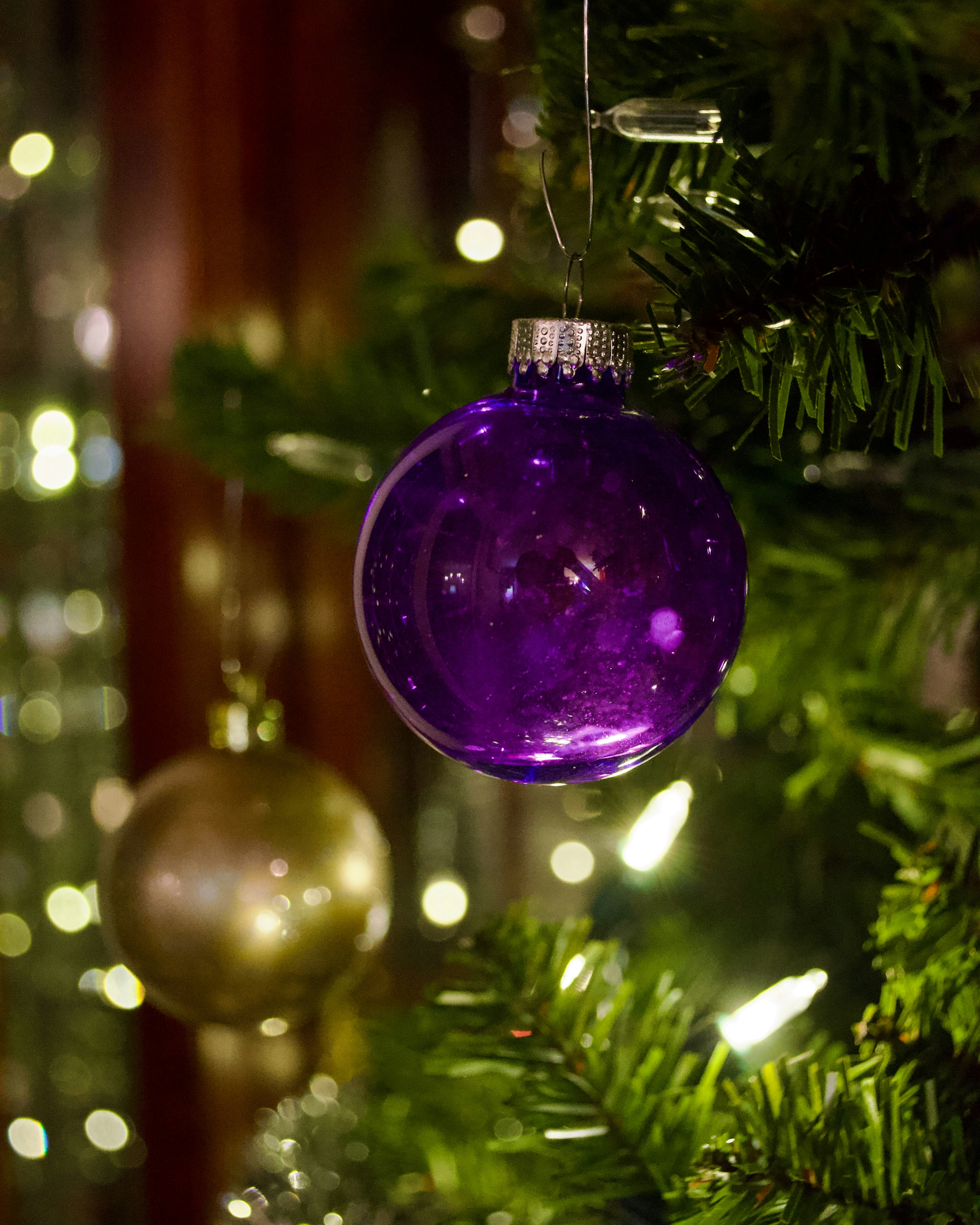 Purple Ornament, Warm Lights: A Christmas Tree Moment