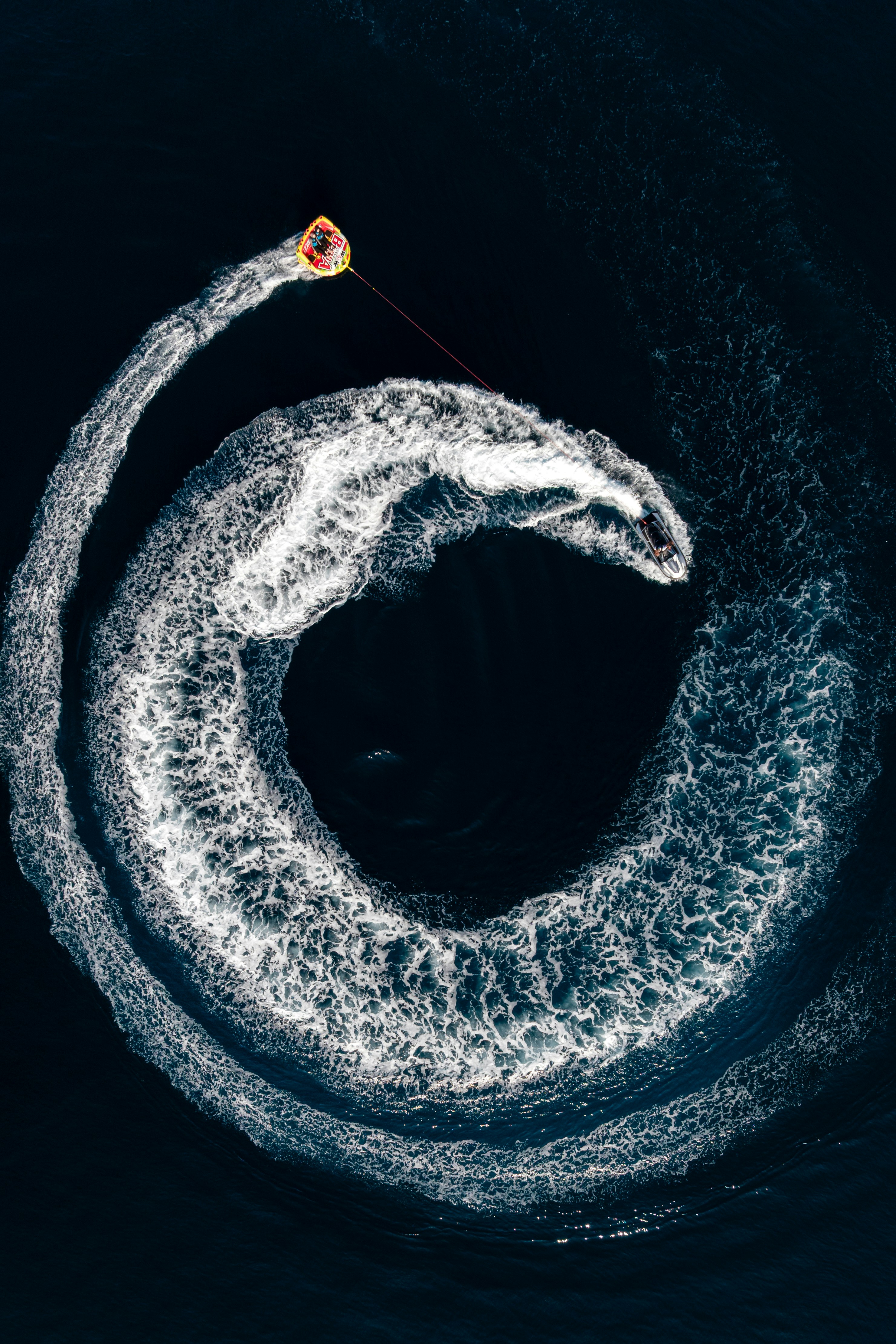 Whirlpool of Waves: Aerial Torus with Rescue Boat